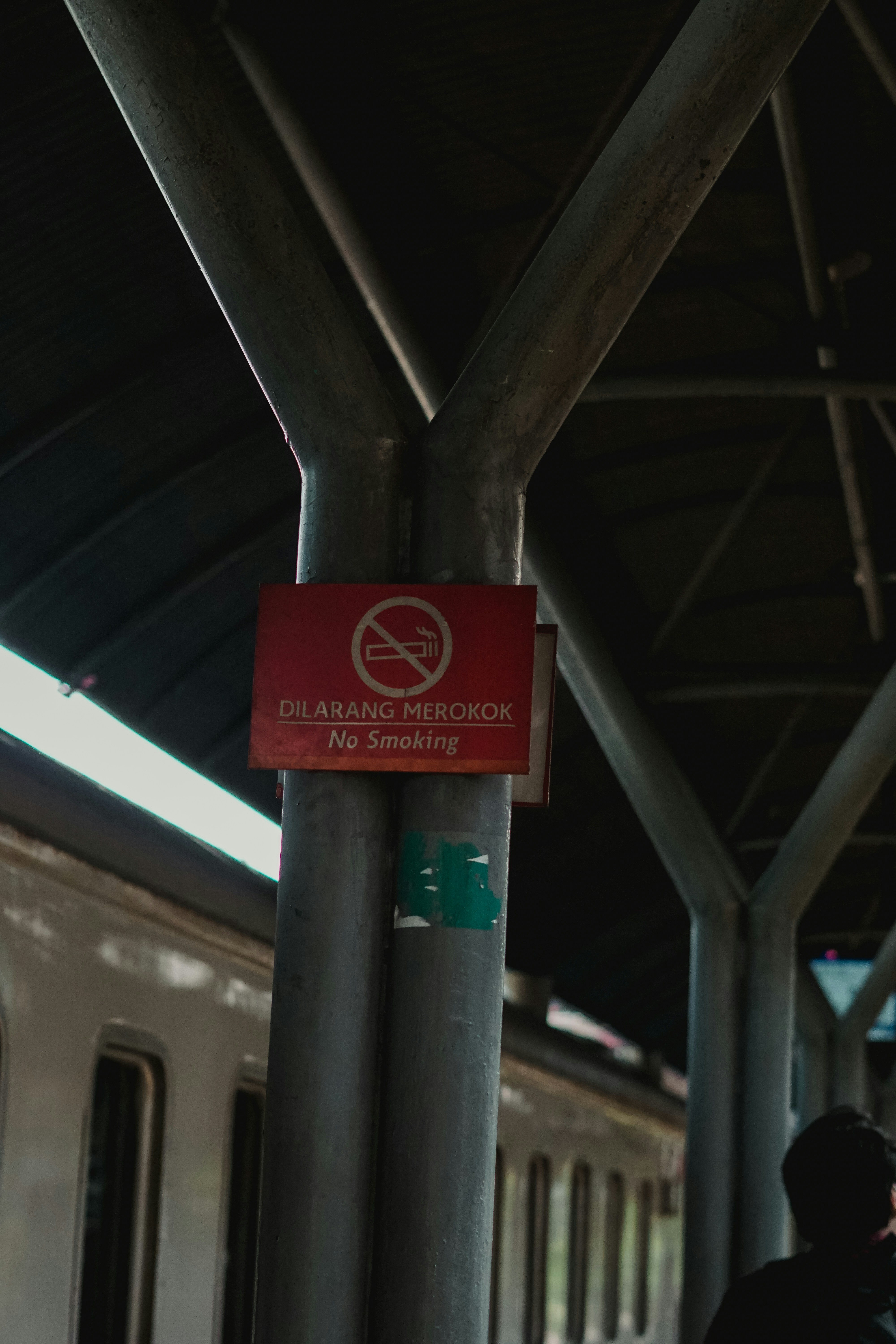 A no smoking sign on the side of a train photo – Free Warning Image on ...