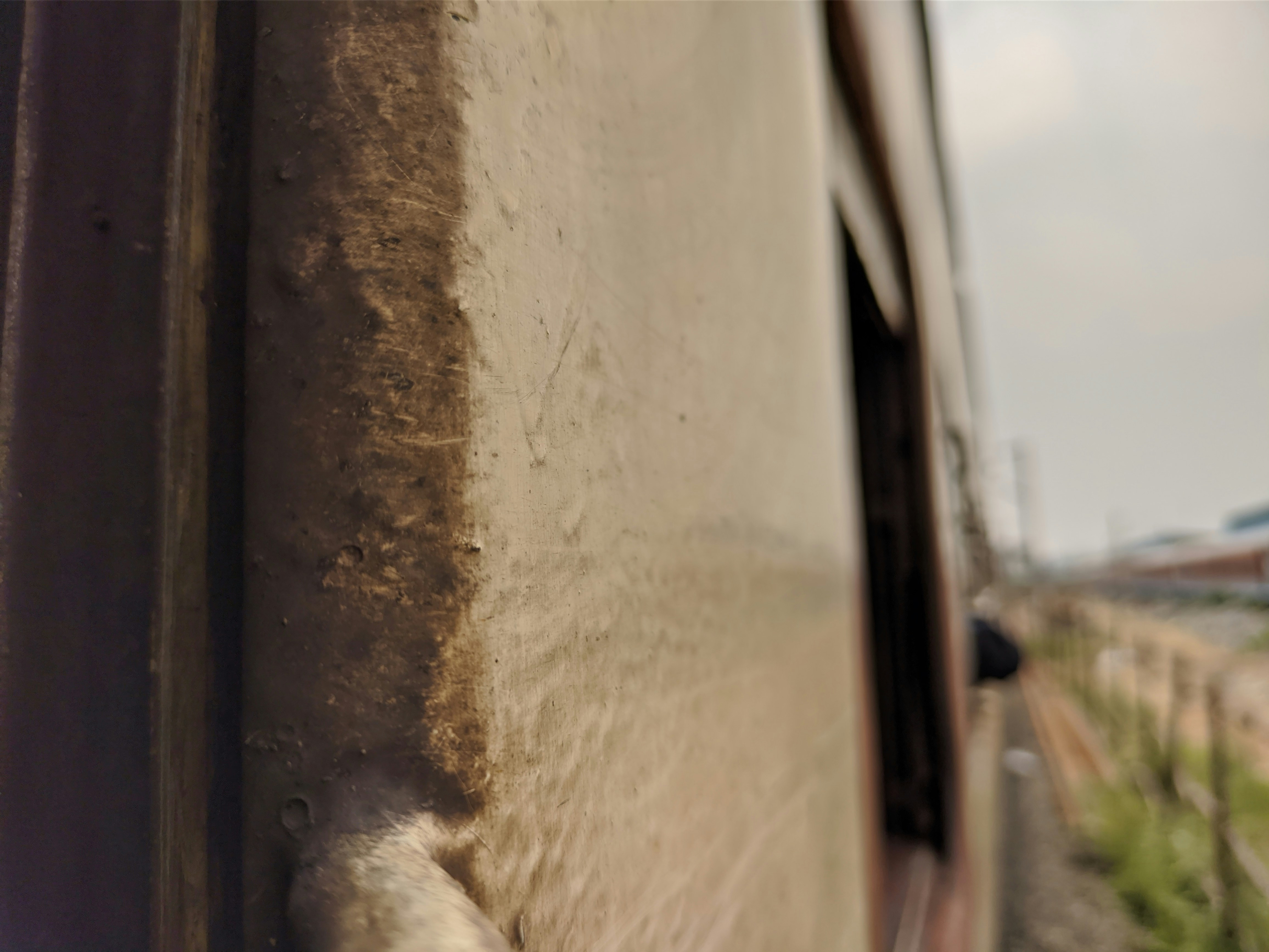 Edge of the Rails: A Side View into the Moving Landscape