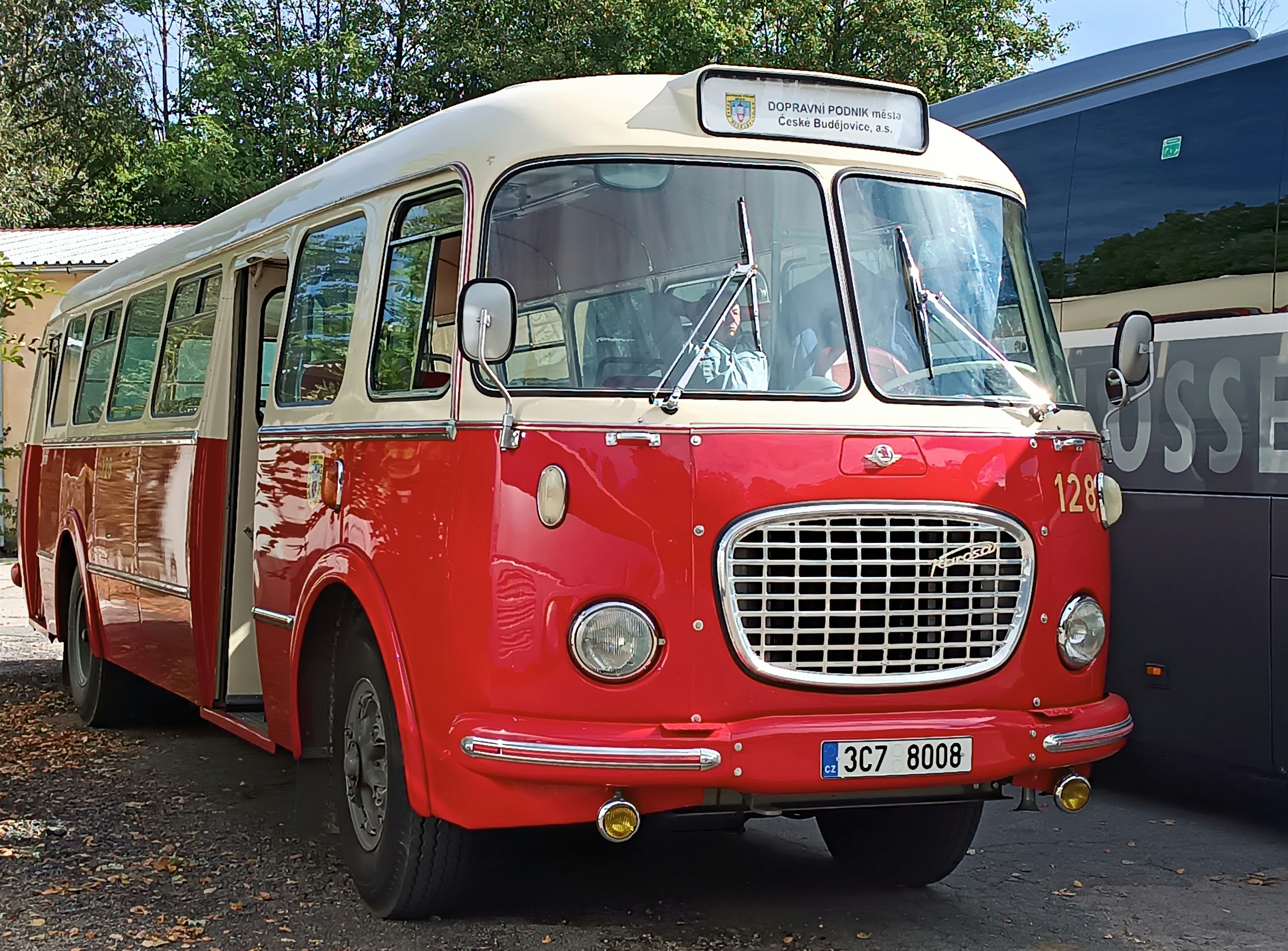 A red and white bus parked next to a blue bus photo – Free Třeboň Image ...