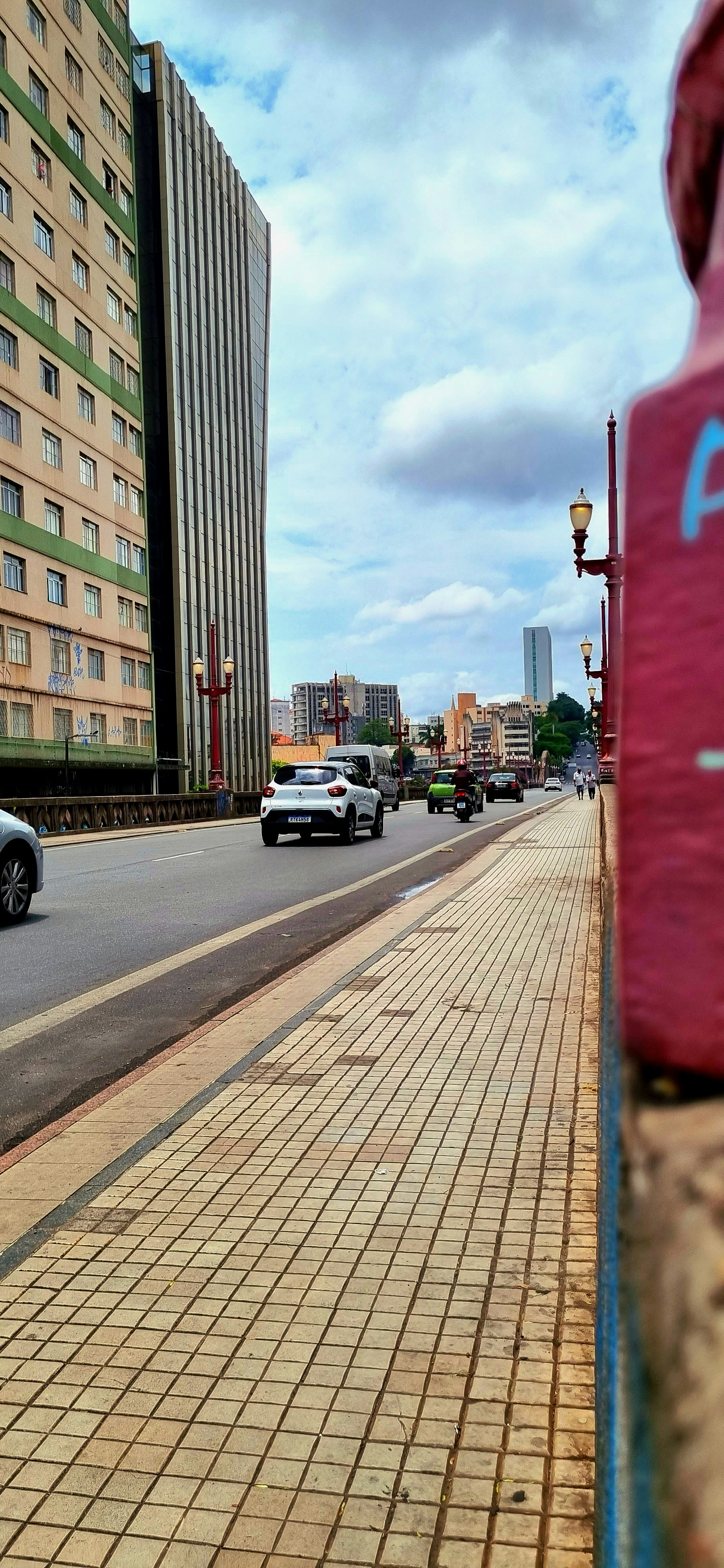 Between Tiles and Towers: A City Street in Motion
