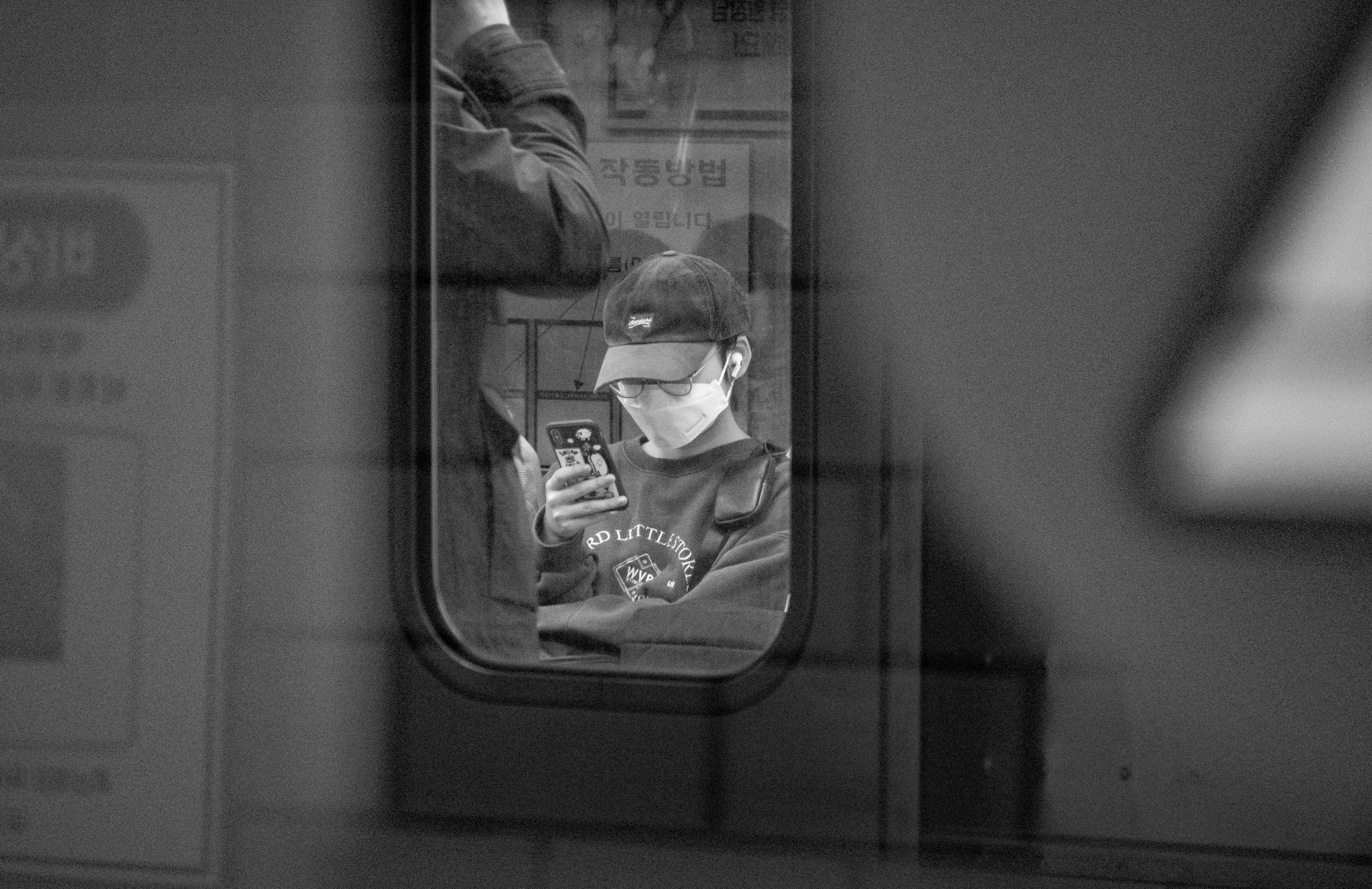 A reflection of a man in a mirror photo – Free South korea Image on ...