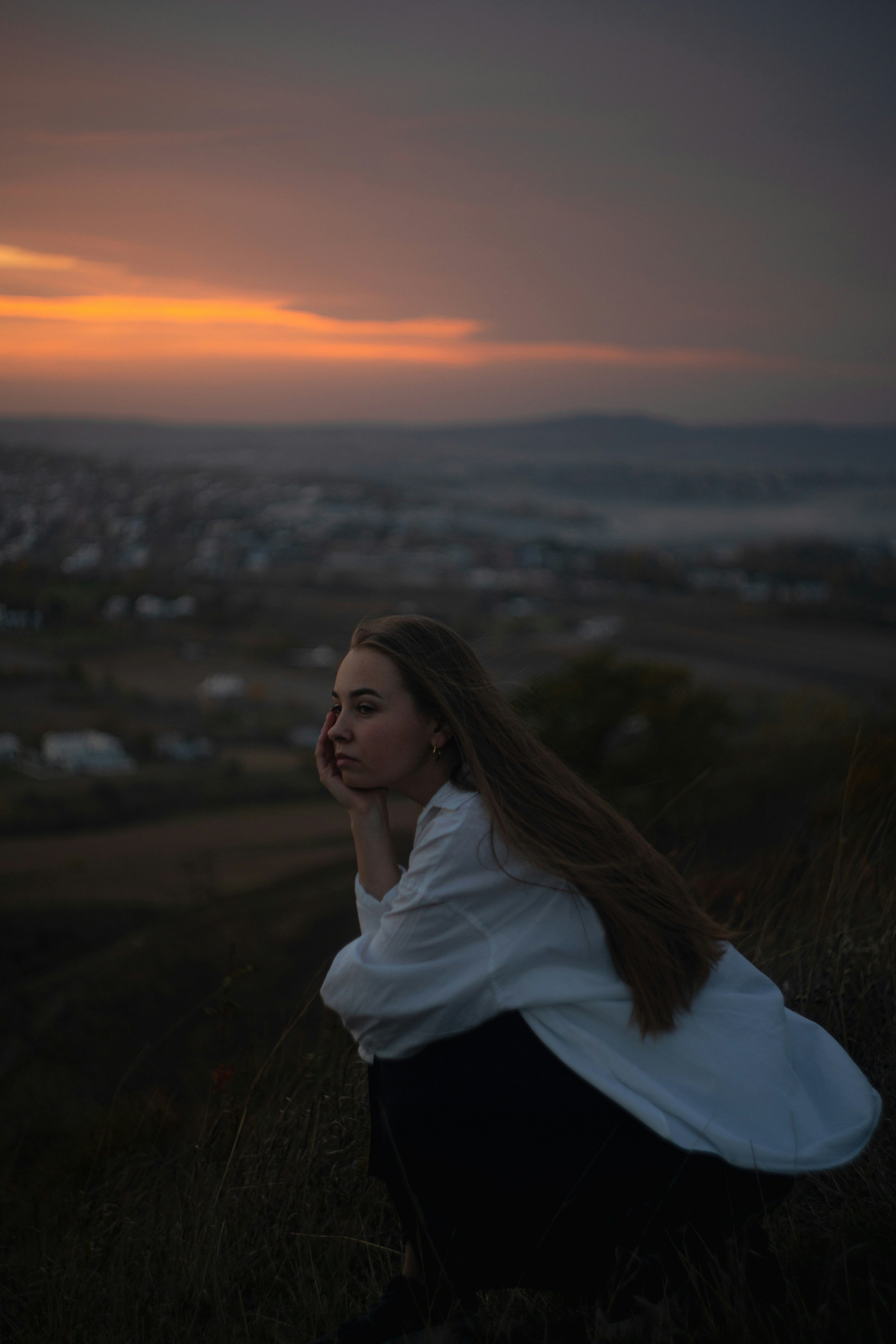 Dusk Gaze on the Hill: A Quiet Contemplation in Wind and Light