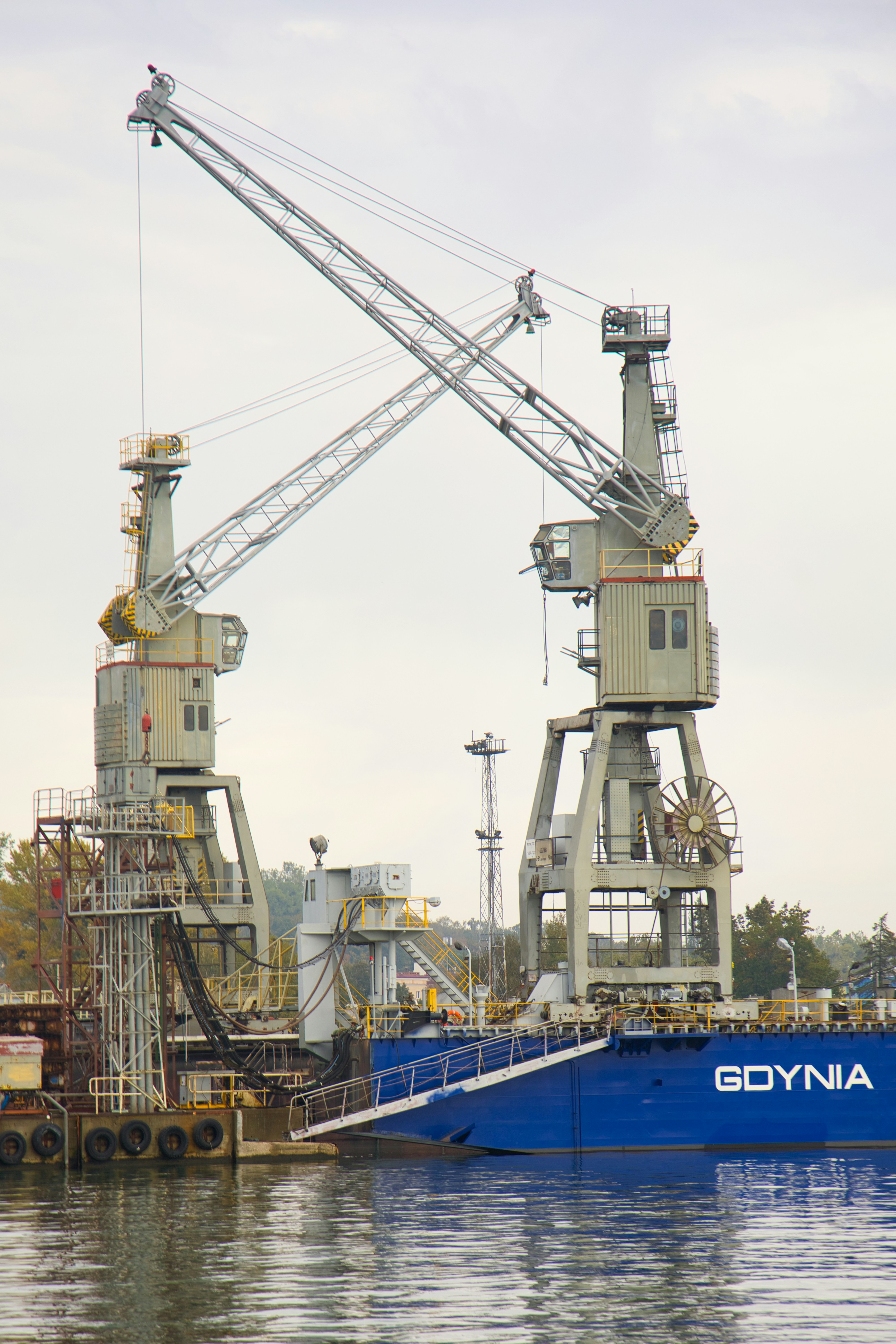 A large blue boat in a body of water photo – Free Port gdynia Image on ...