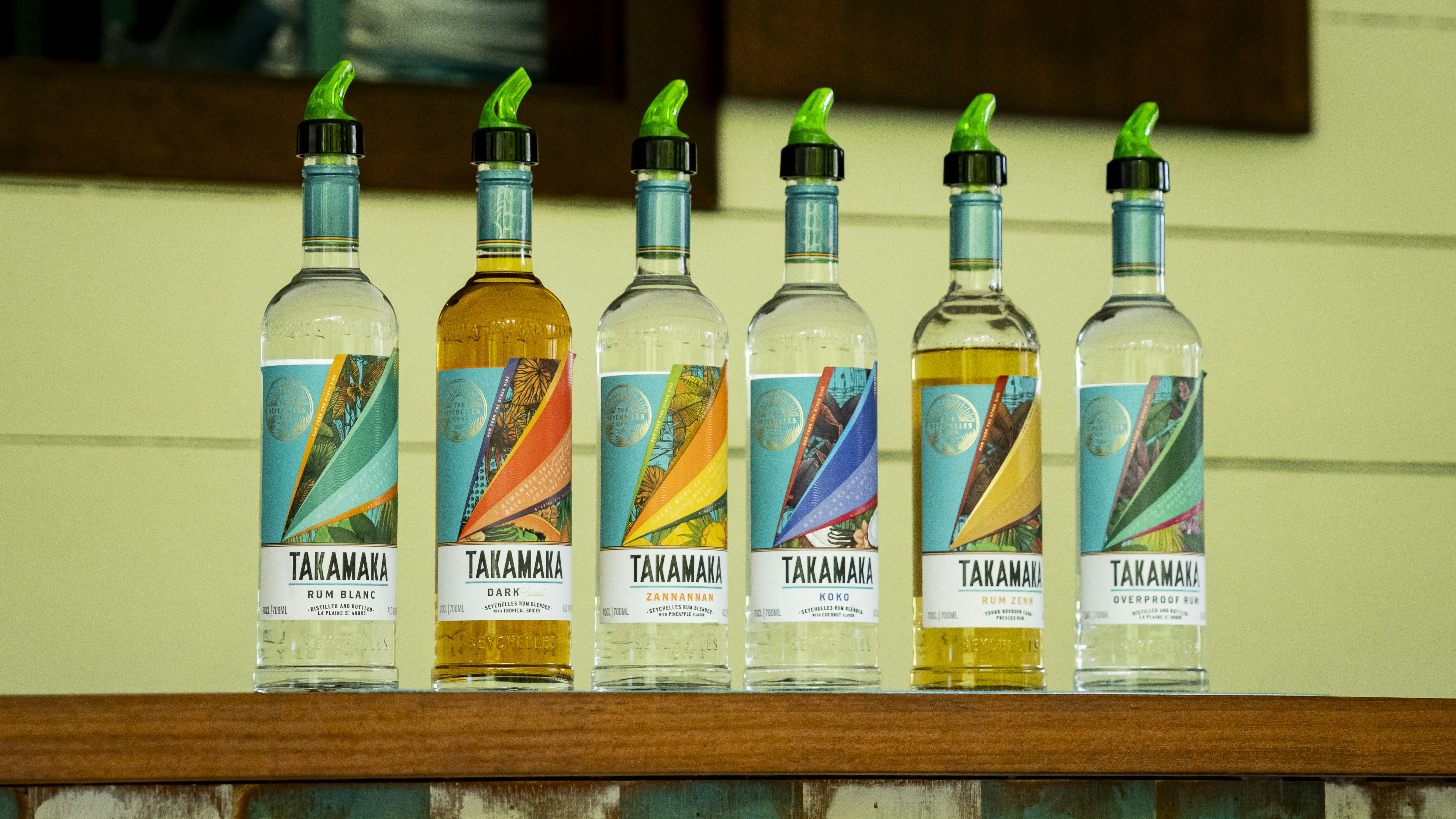 Row of Takamori Bottles: a curated display of color and craft