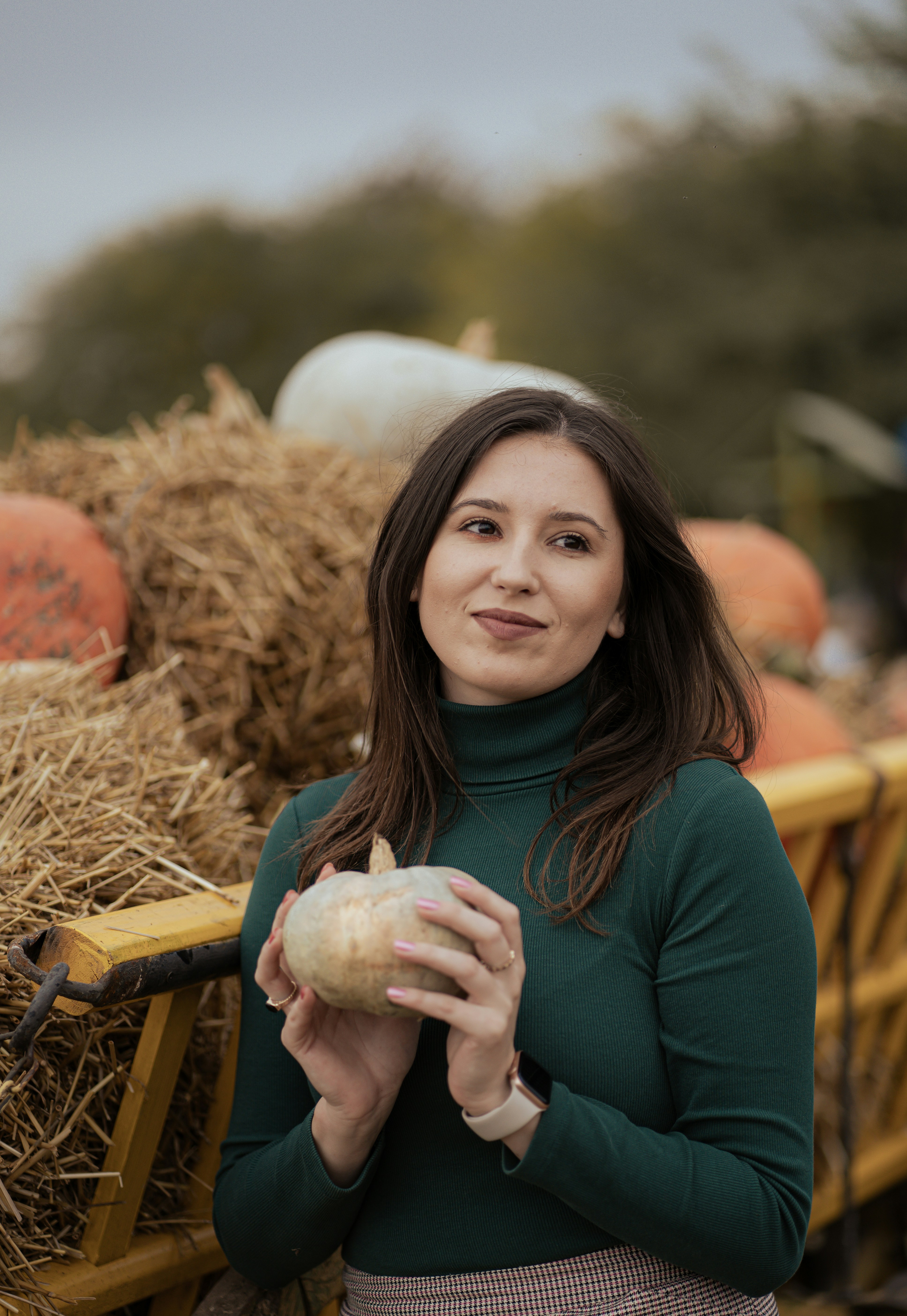 a woman holding a piece of bread in her hands