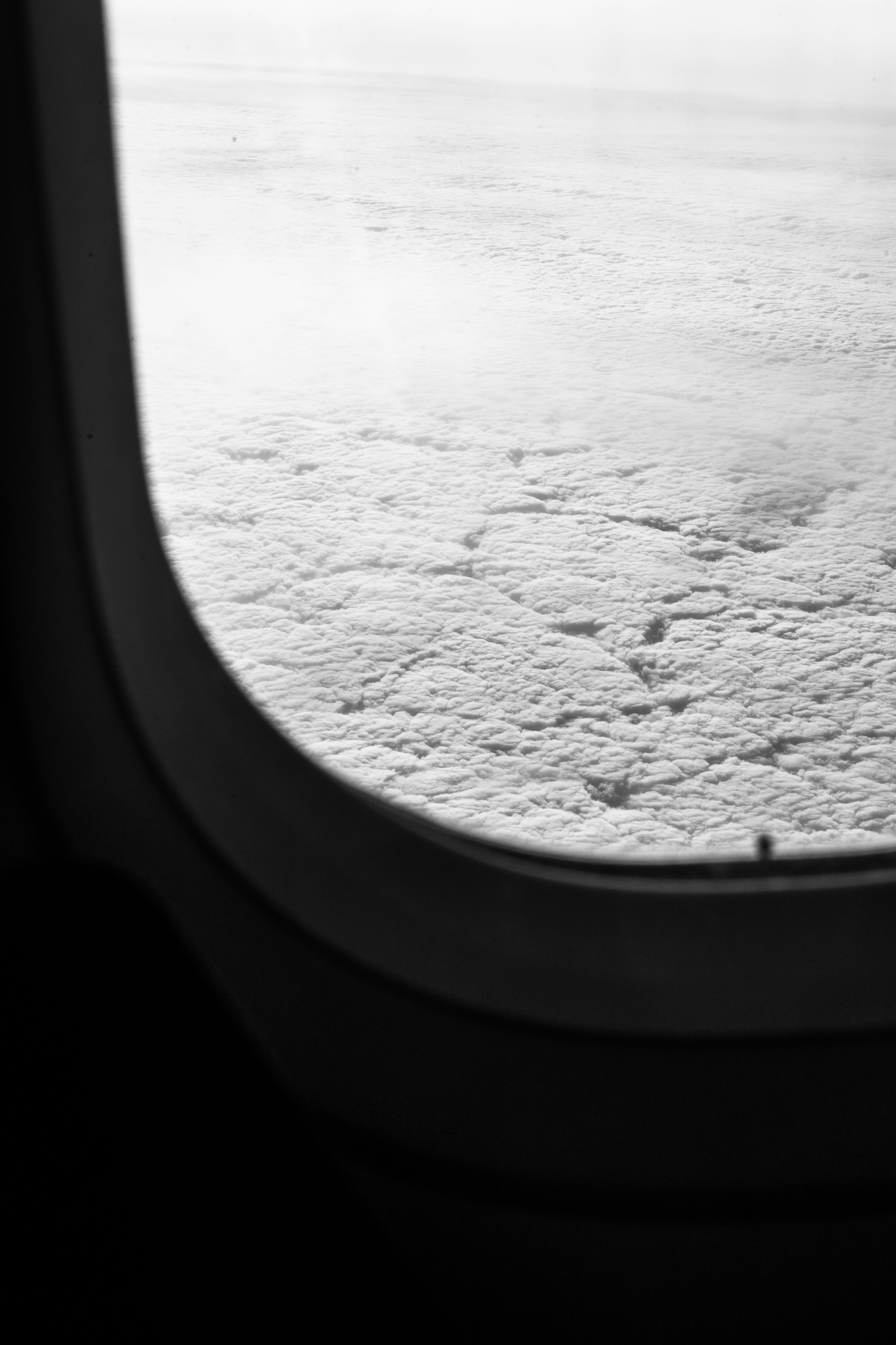 Cloudscape Through a Window: A Journey Above