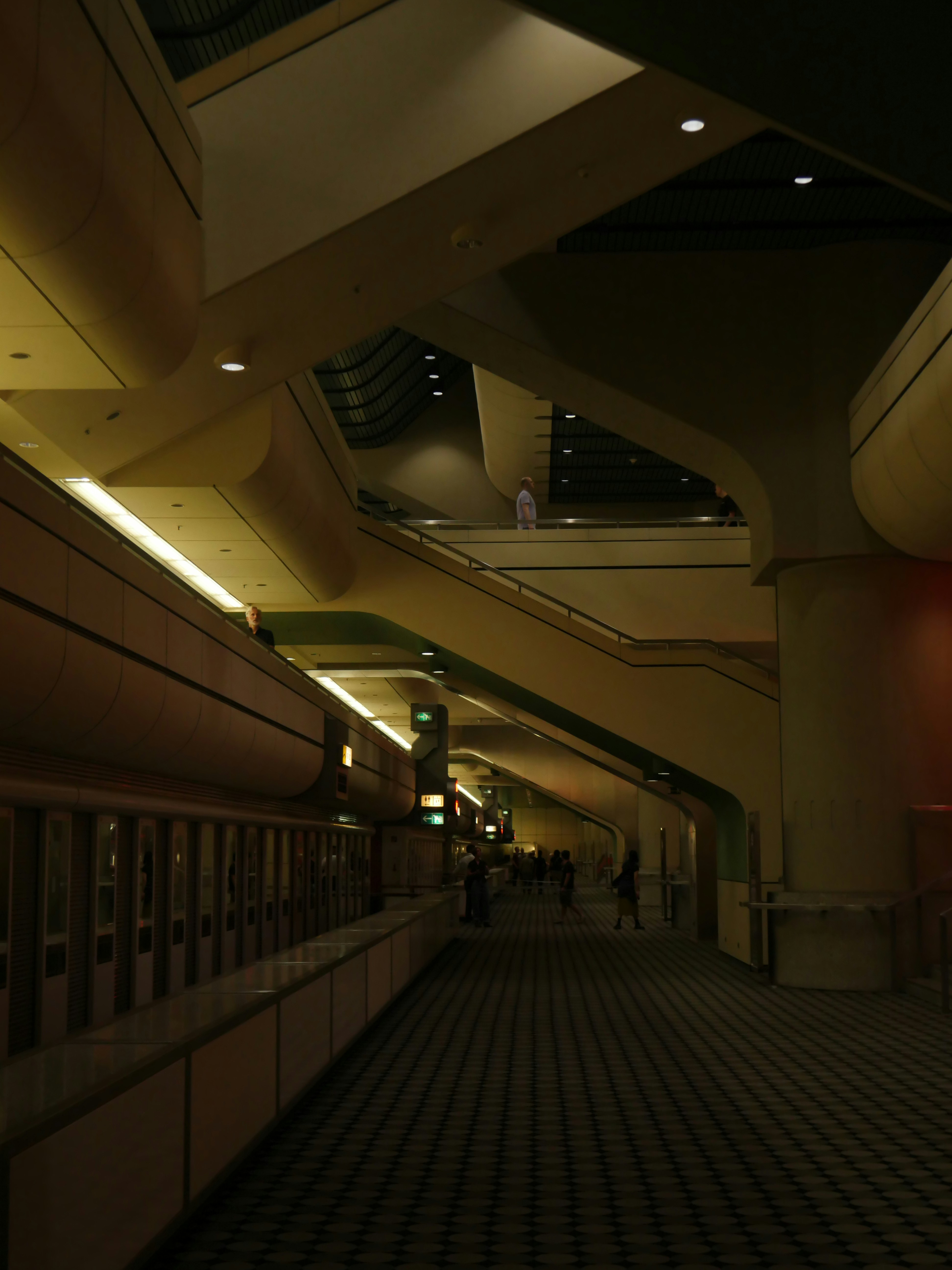 Amber Arches: Convergence Through a Multi-Level Transit Hall