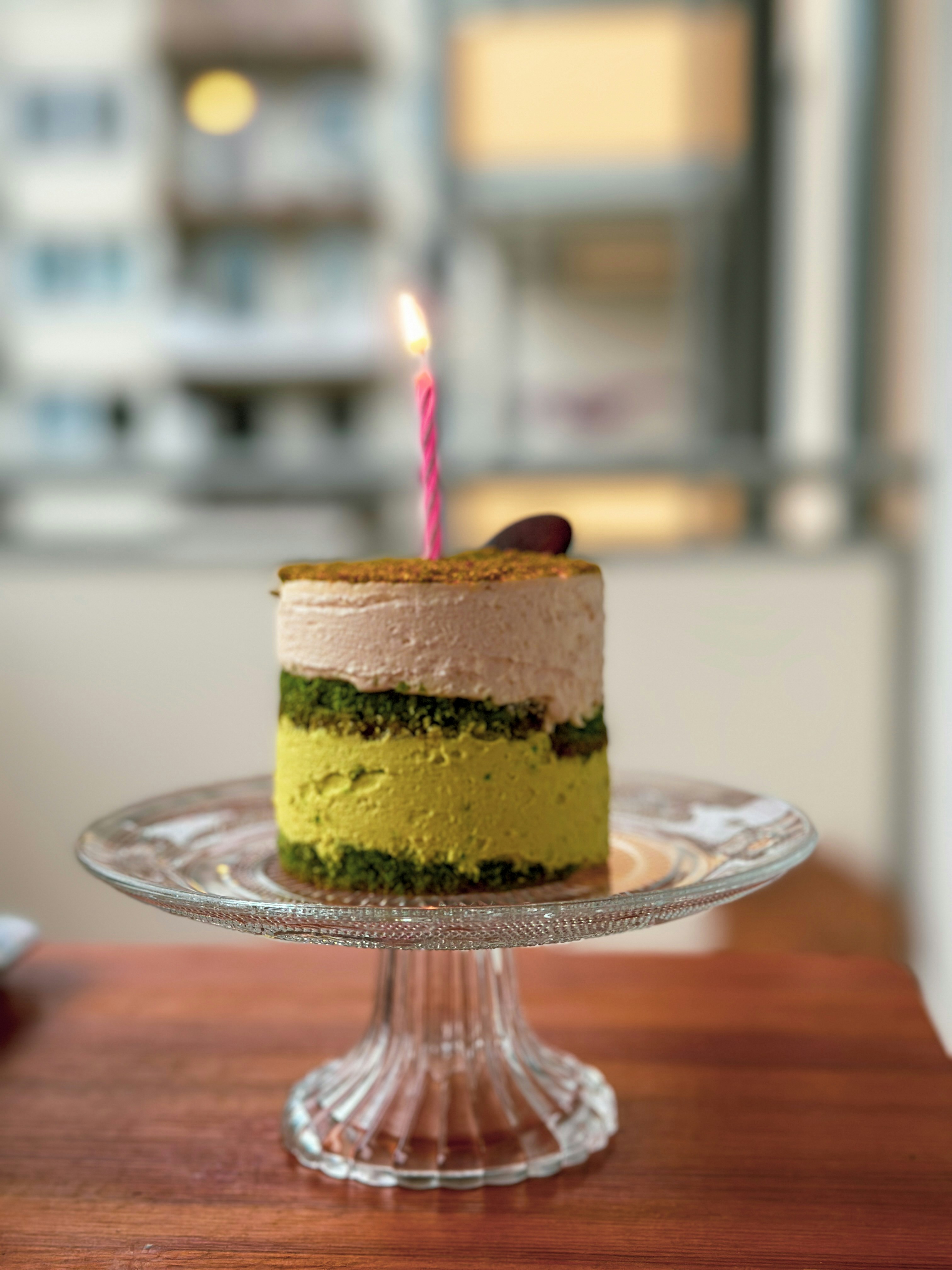 Three-Tone Layer Cake on a Glass Pedestal, Candlelit