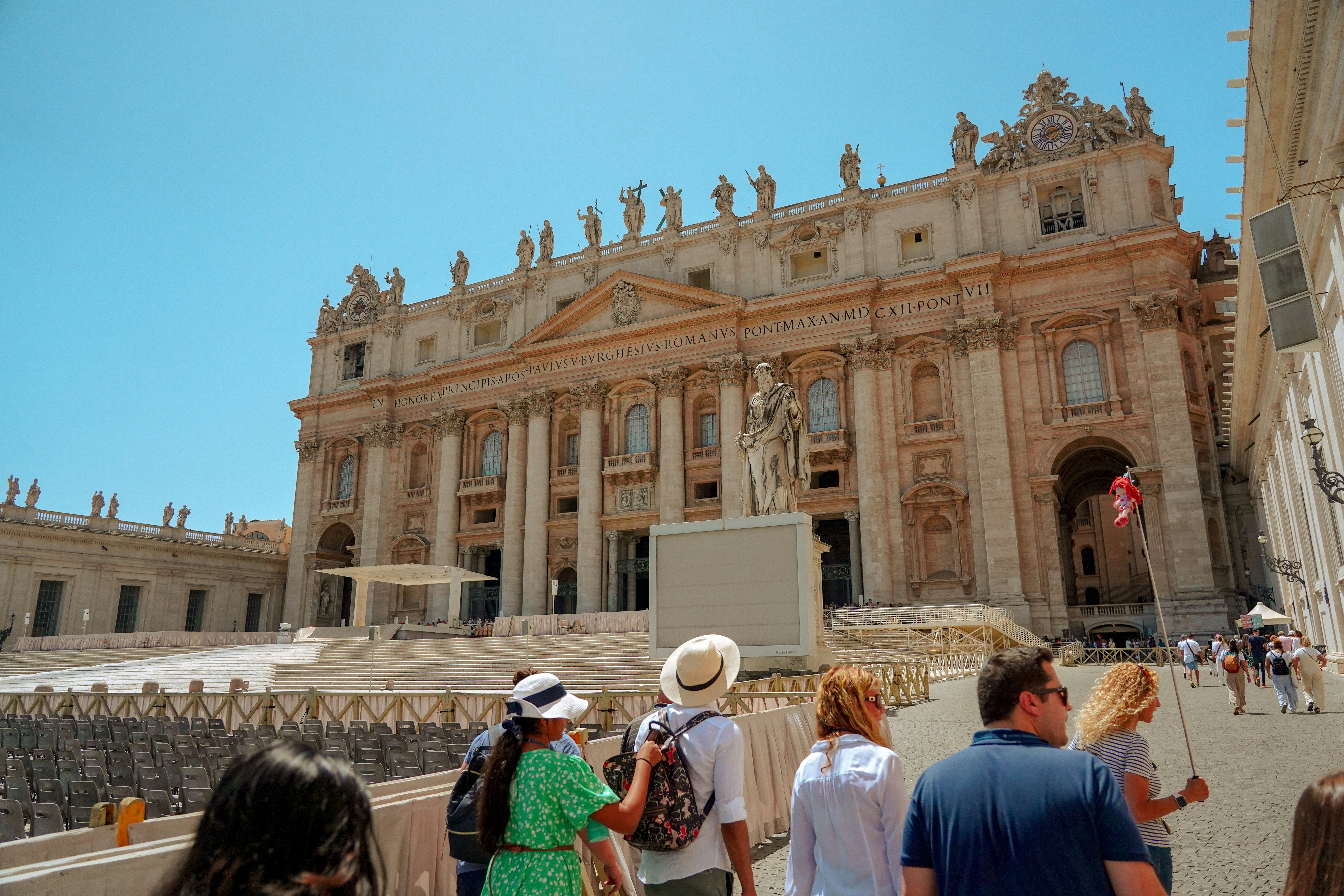 Stone Quiet: The Grand Steps and Statue in Front of a Classical Facade