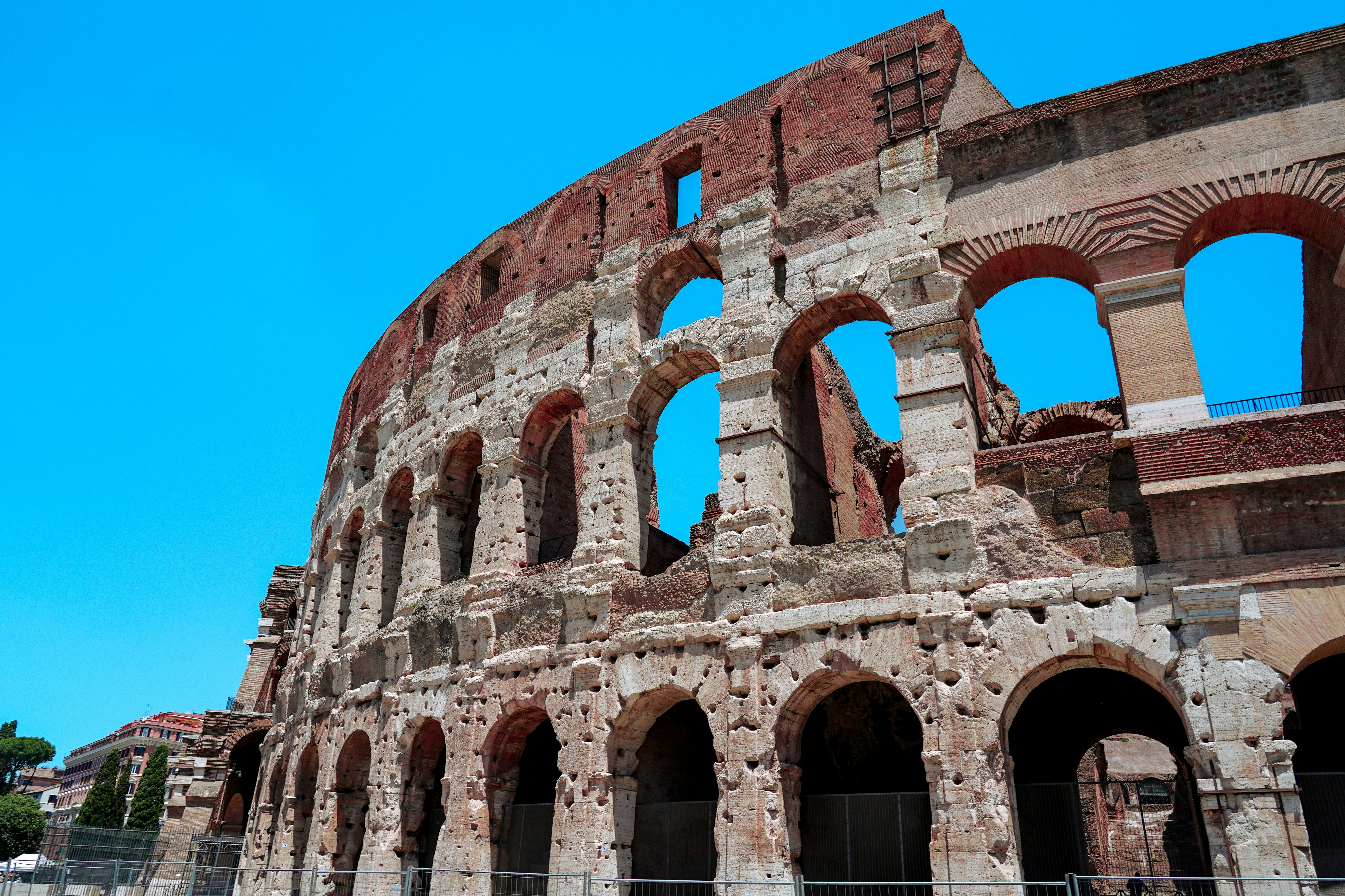 A very old building with a fence around it photo – Free Rome Image on ...