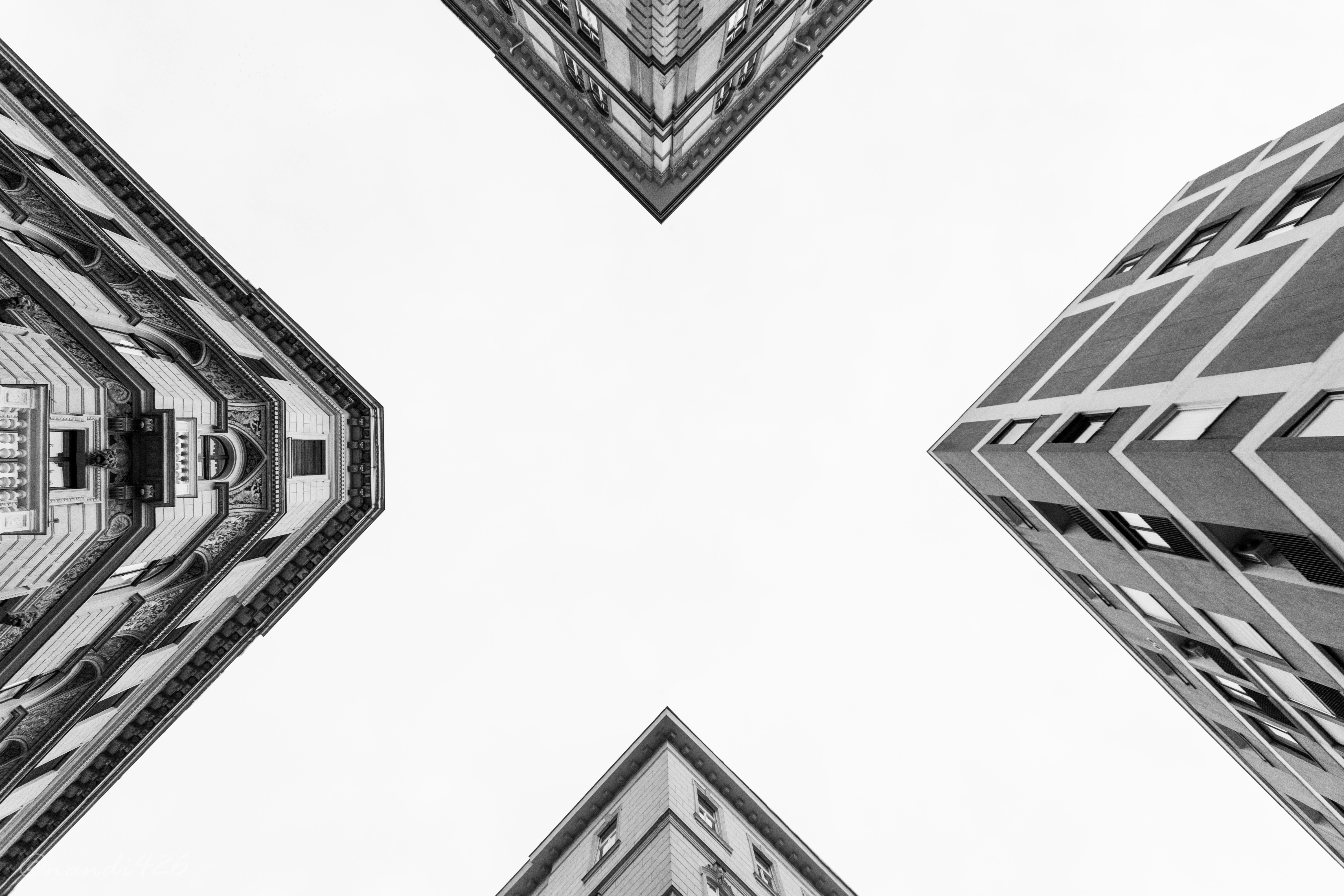 A black and white photo of some buildings photo – Free Triangle Image ...