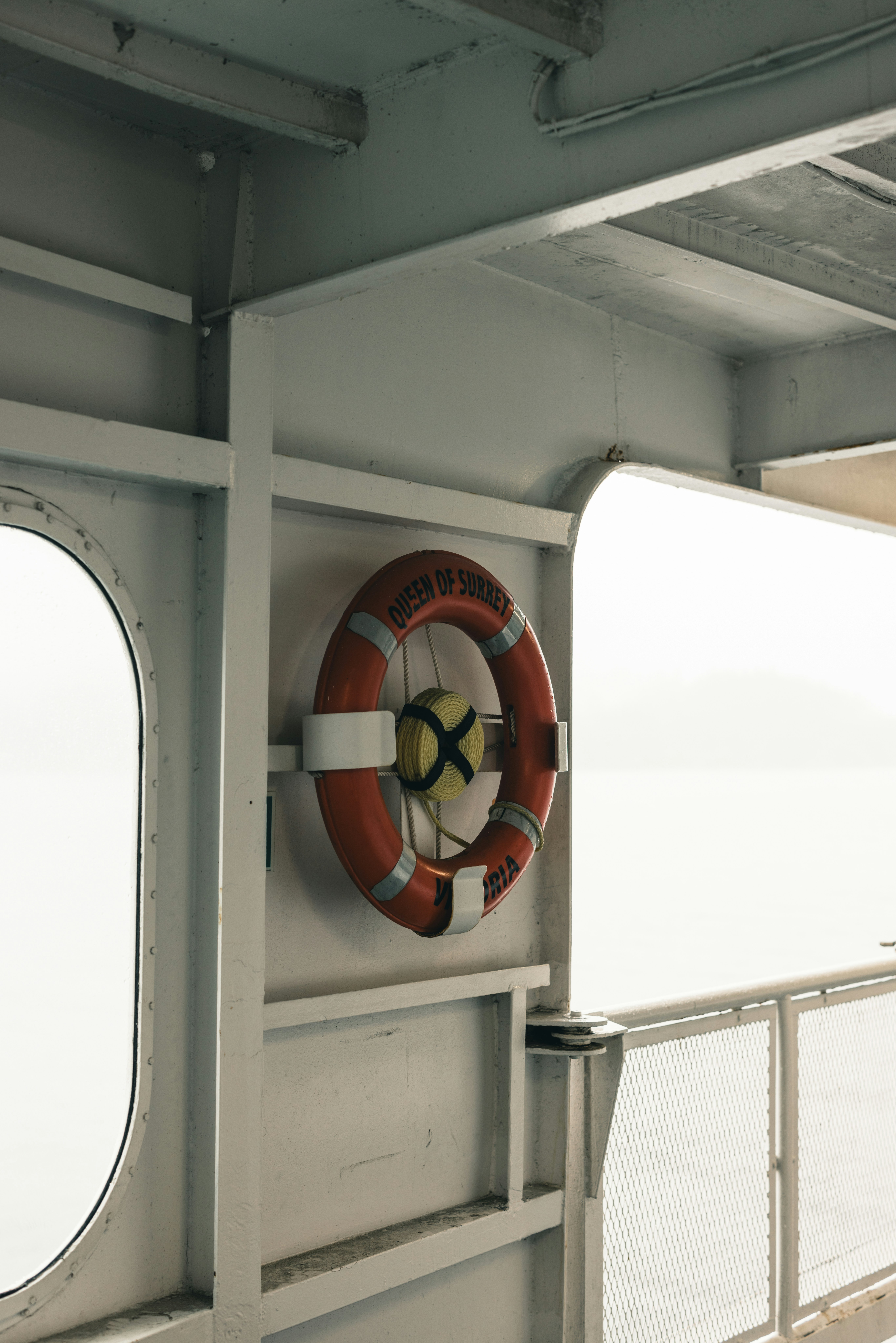 A life preserver hanging on the side of a boat photo – Free Canada ...