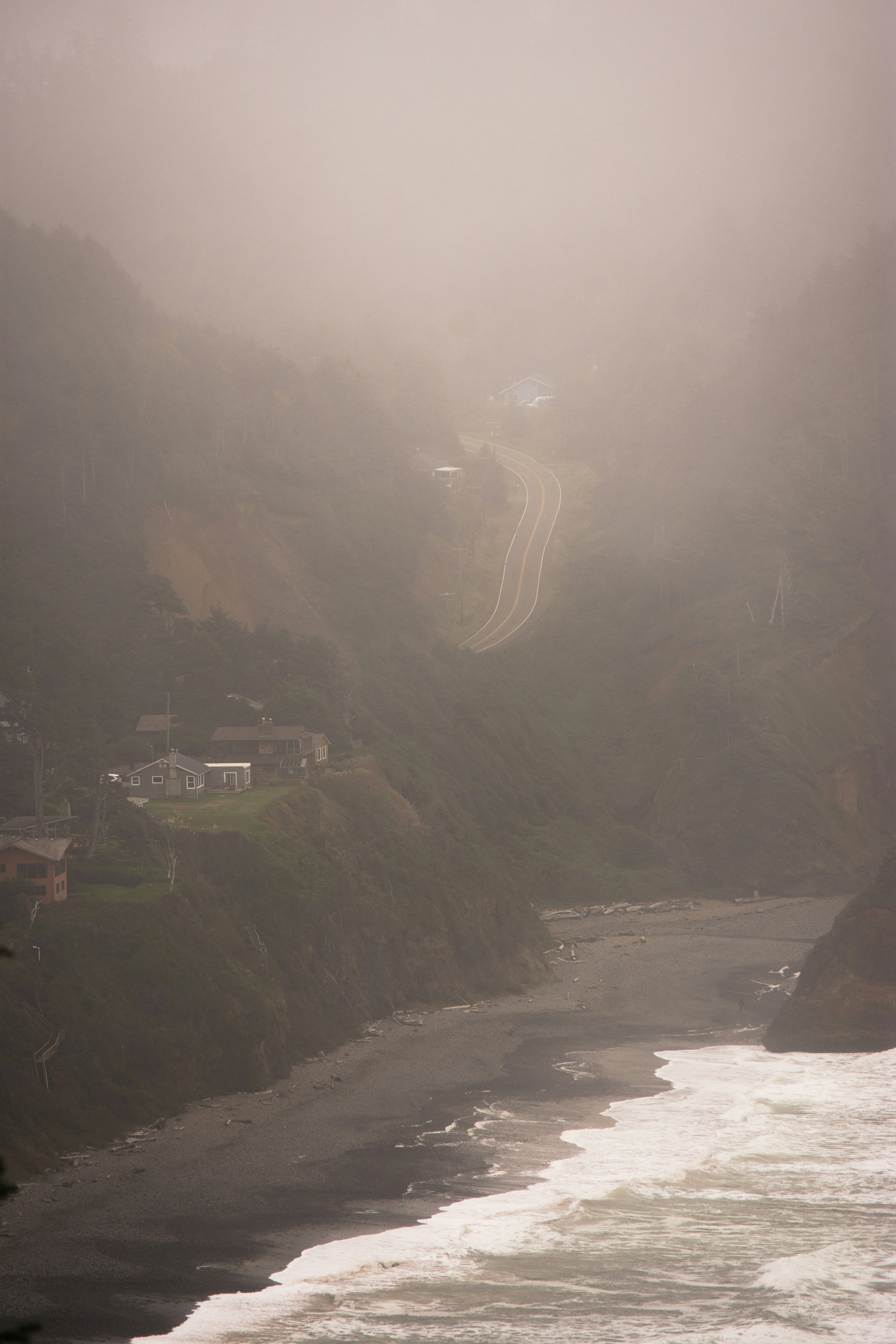 Mist-Wrapped Cliff Road: A Quiet Coastal Village Emerges