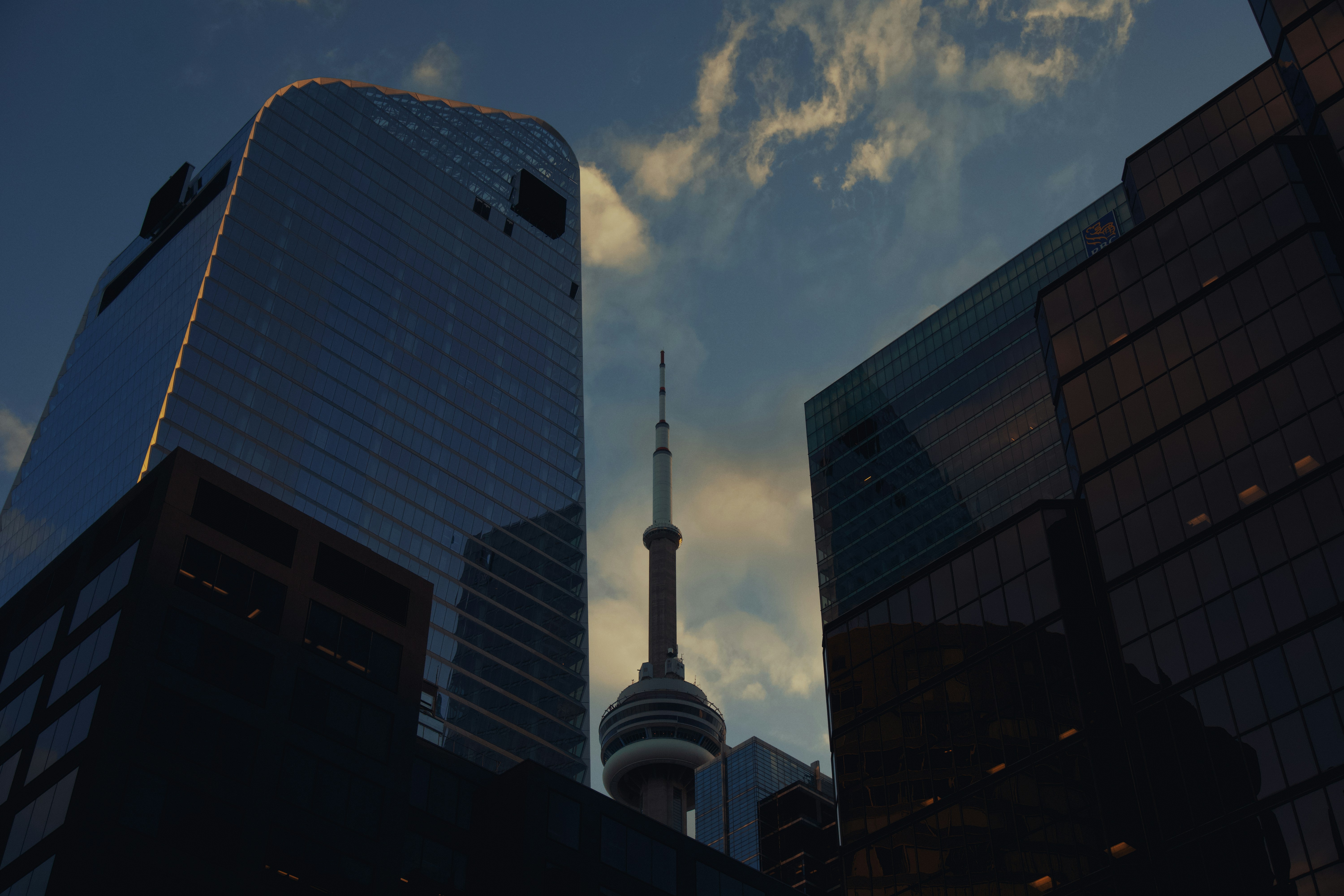 A view of a city with tall buildings and a sky scraper photo – Free Cn ...