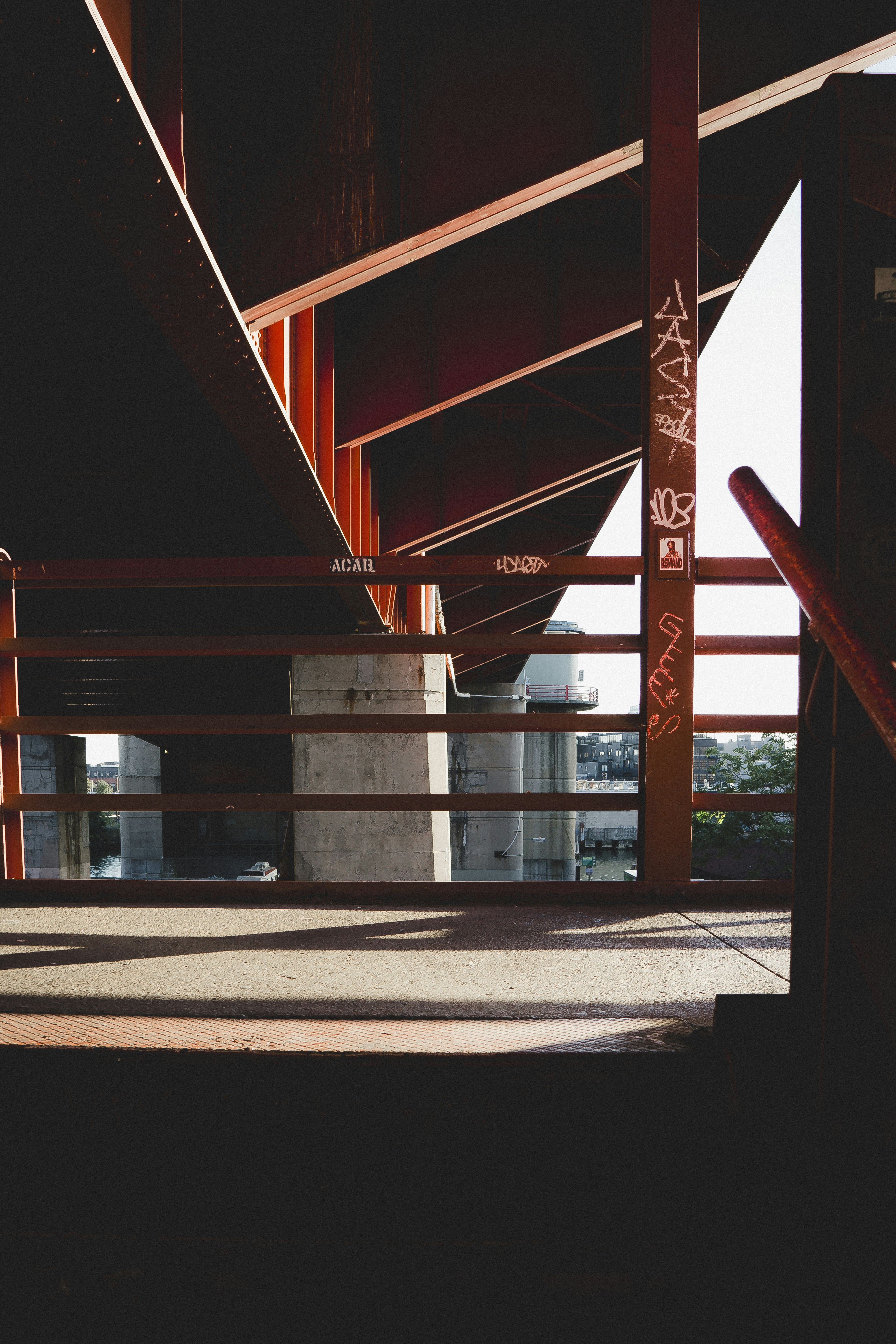 A man riding a skateboard down a ramp photo – Free Building Image on ...