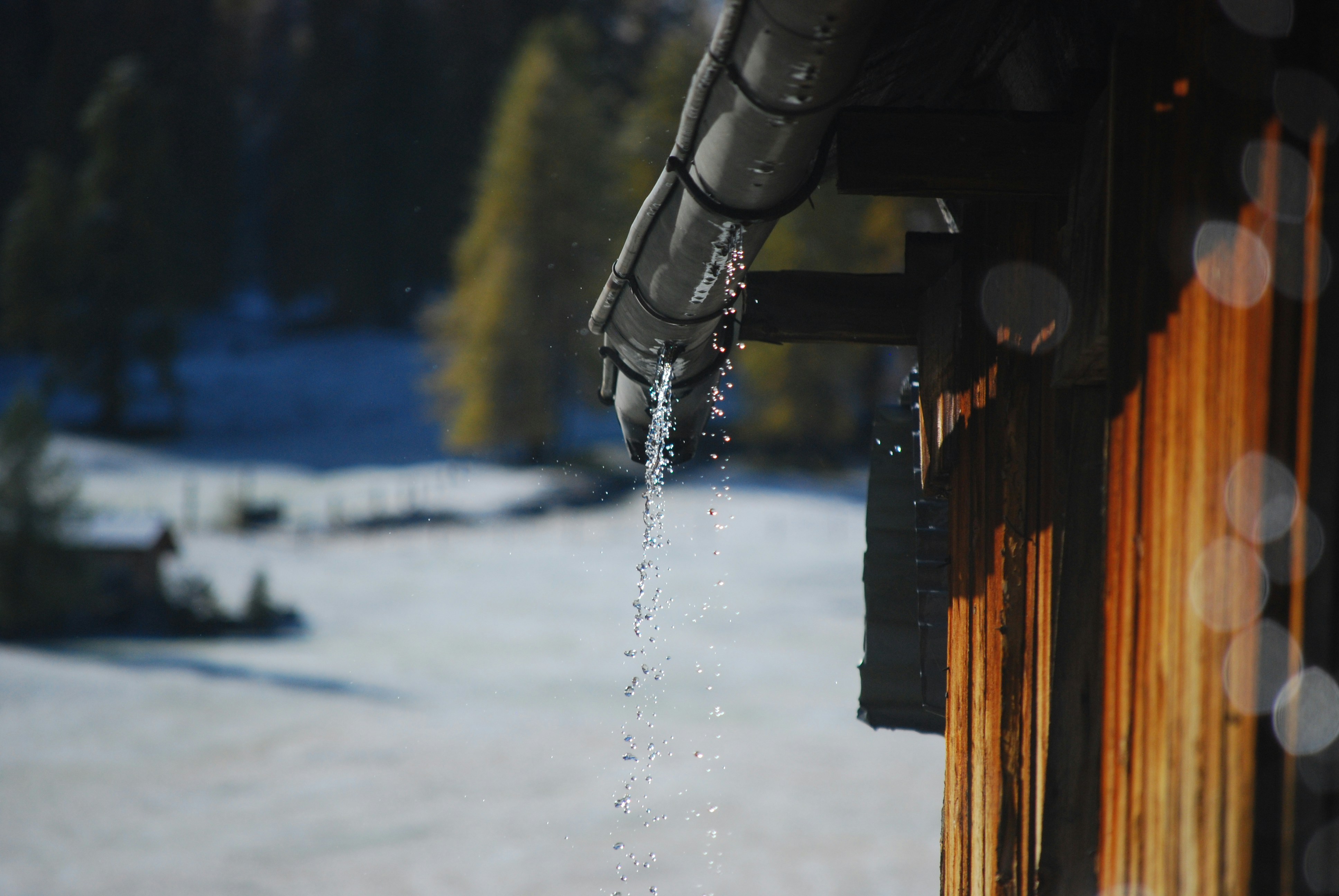 A water spewing out of a pipe into the air photo – Free Davos Image on ...
