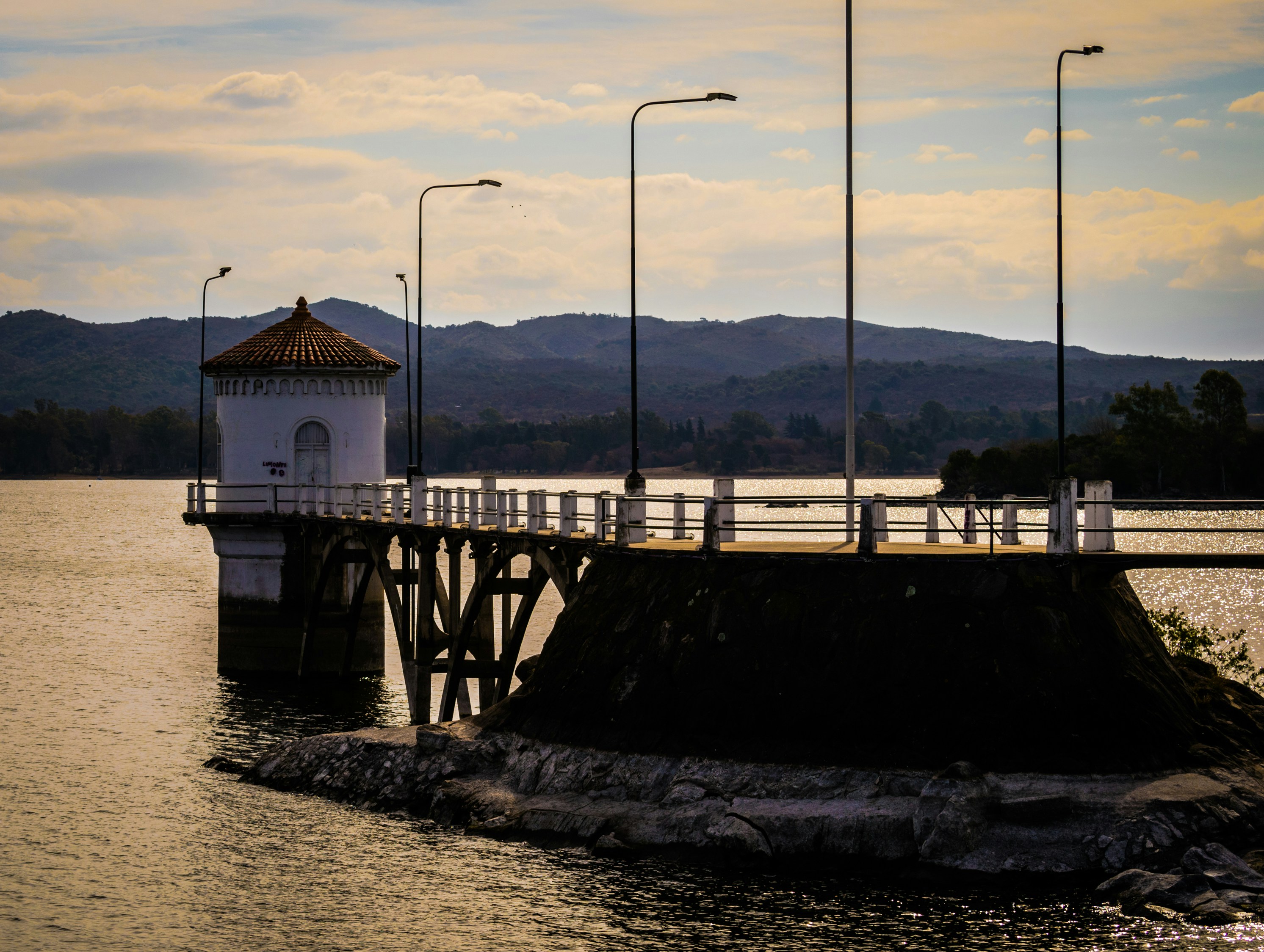 Dusk Lanterns on a Quiet Lake Pier