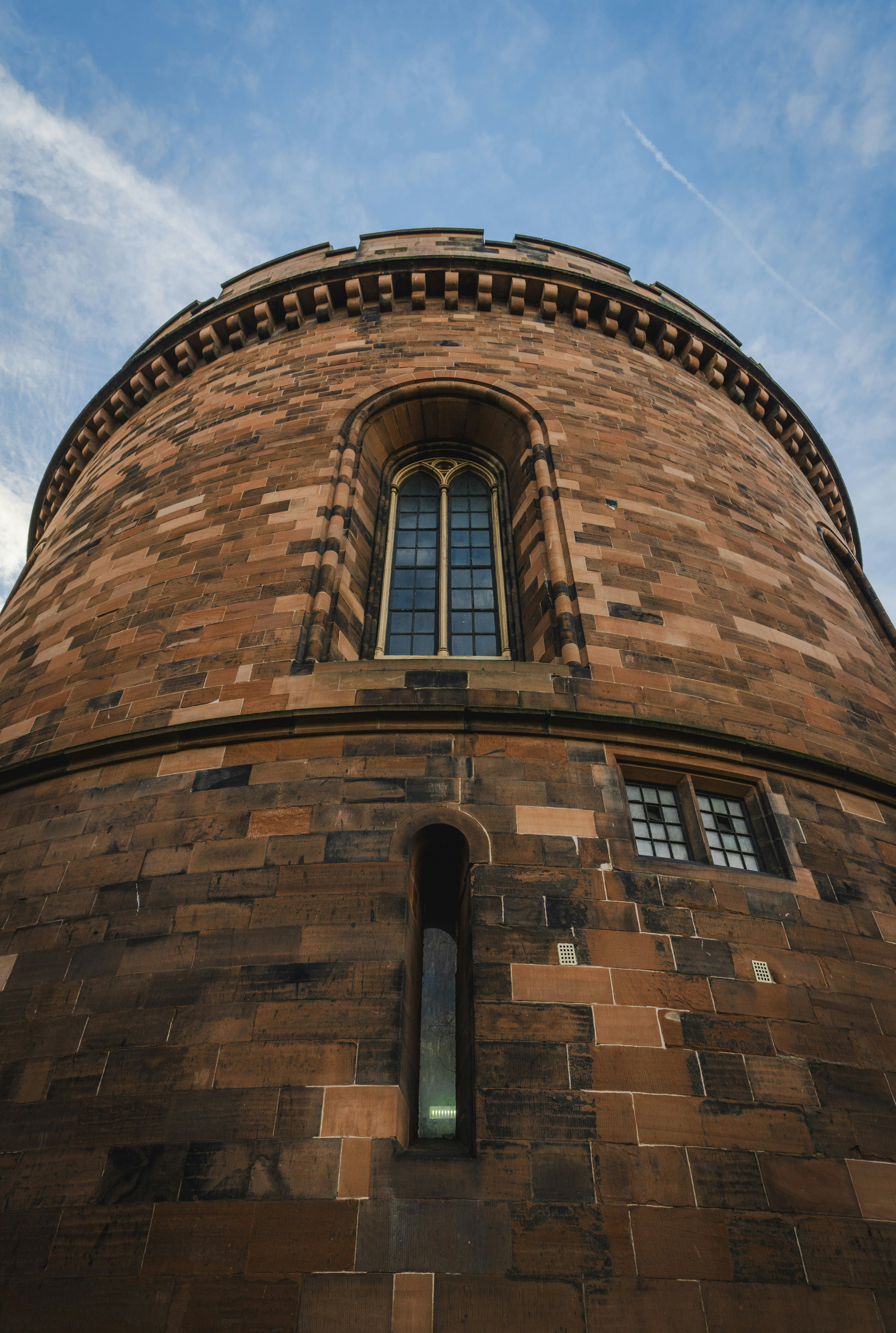 Round Turret at Noon: Brickwork and Windowed Archrise