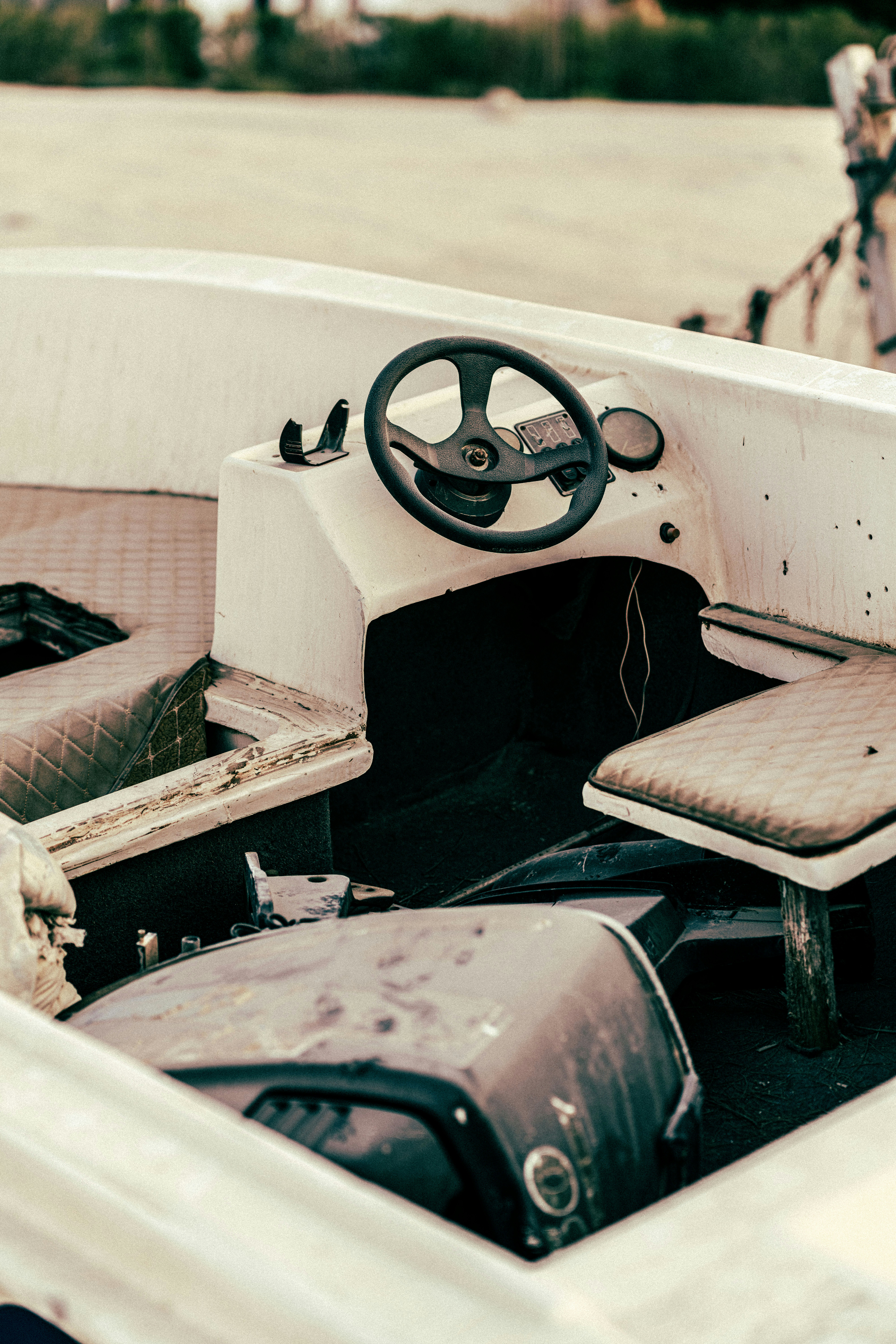 Weathered Helm, Sun-Washed Dinghy: A Quiet Vessel's Story