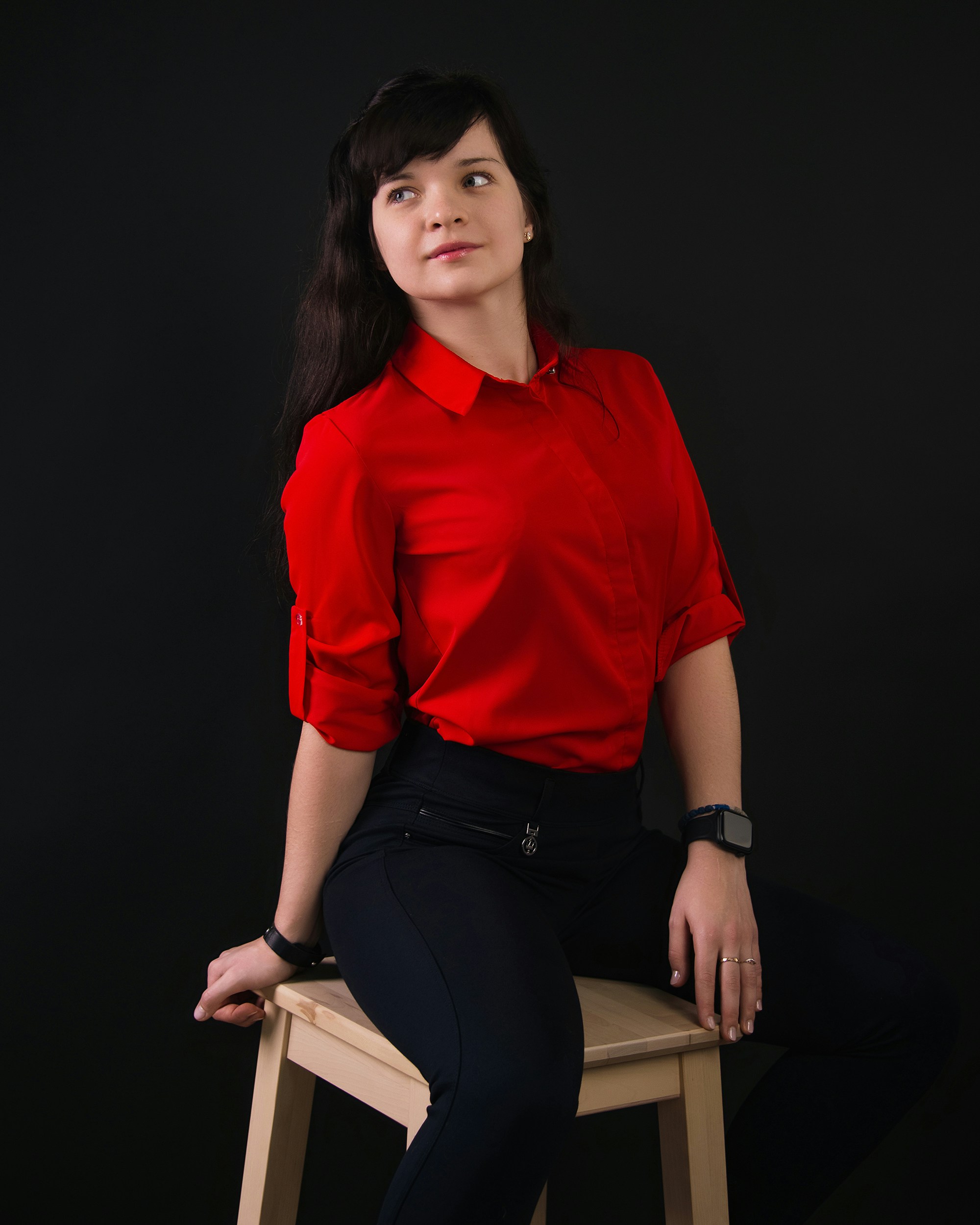 Crimson Calm: Studio Portrait of a Woman in Red