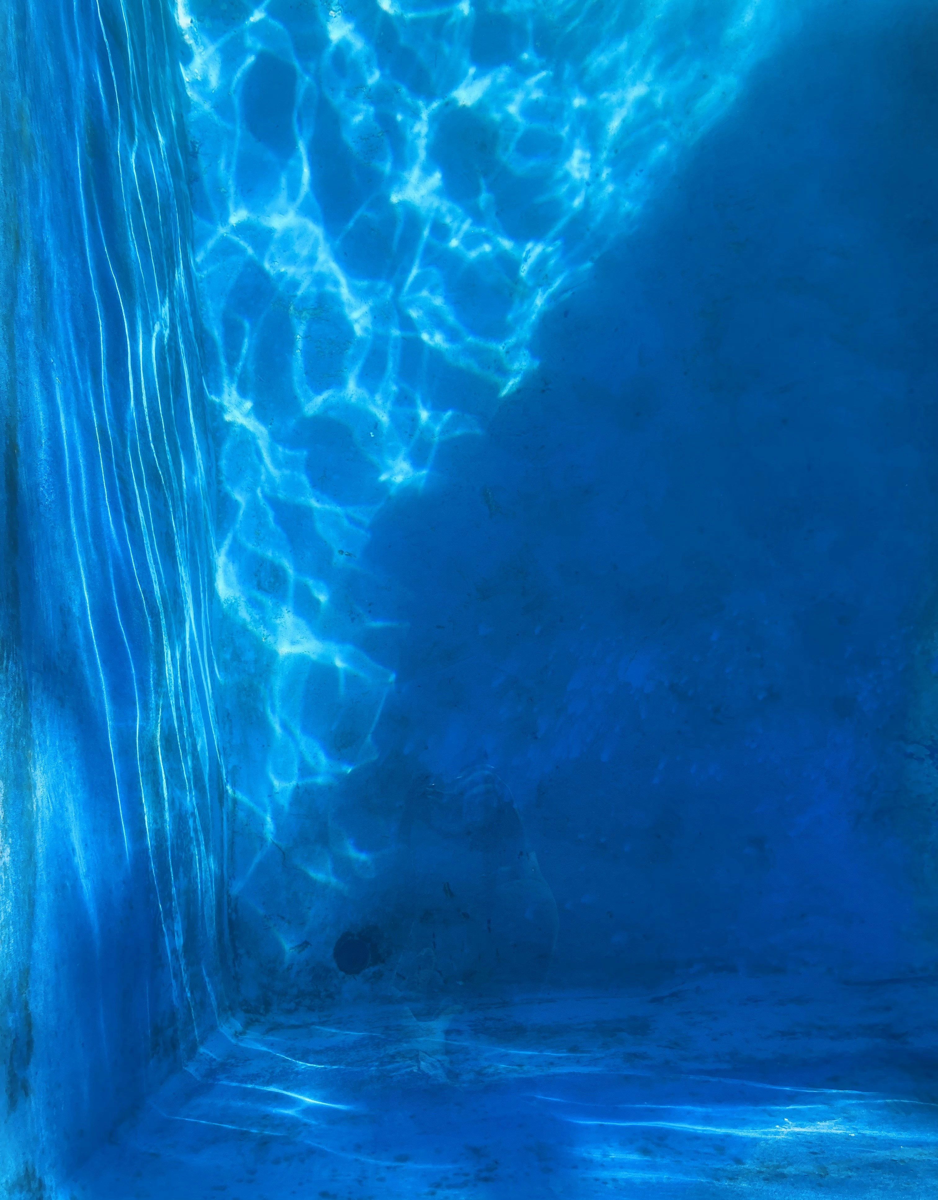 A blue room with a blue wall and water photo – Free Outdoors Image on ...