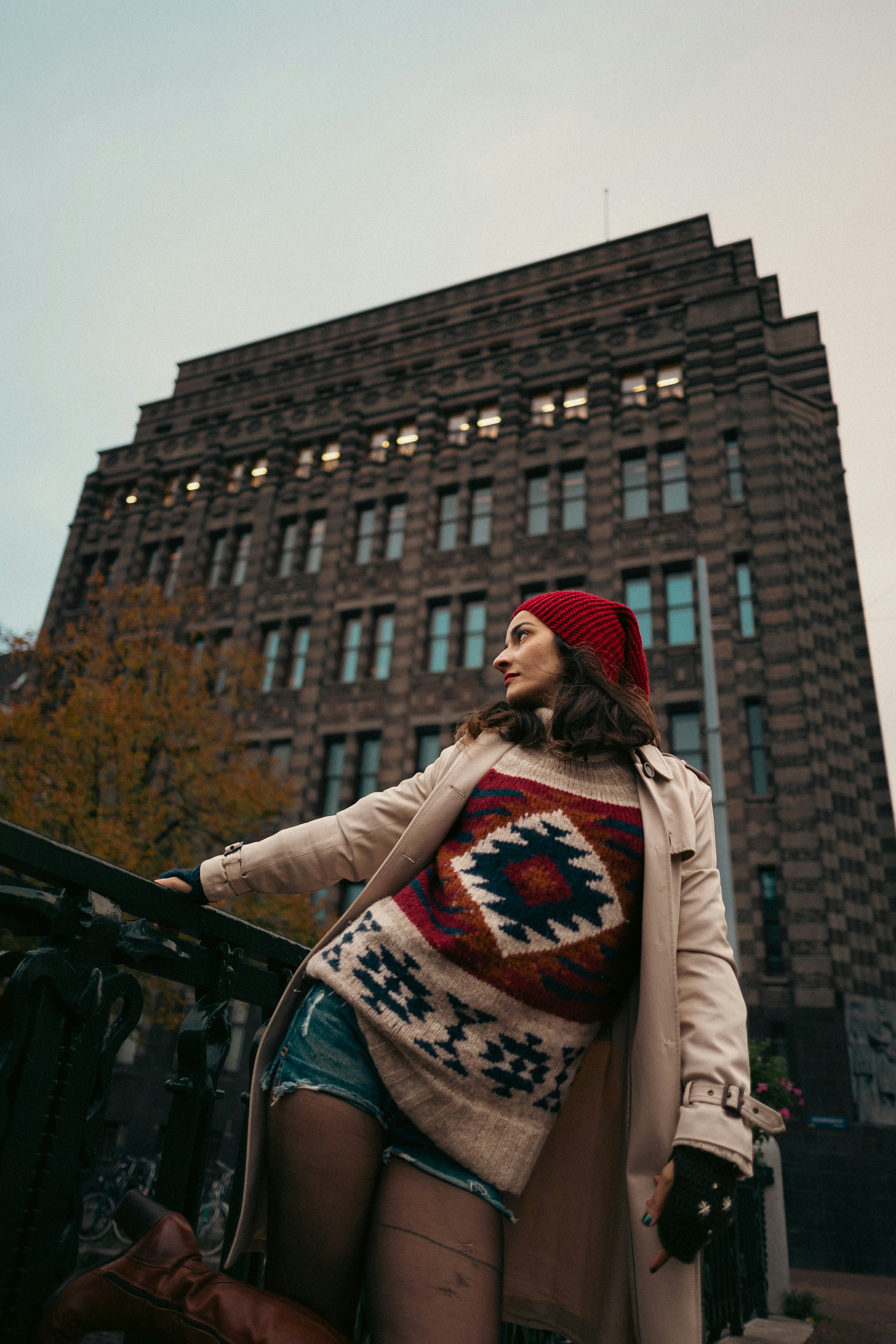 Geometric Knit vs. Brick Skyline: A City Portrait in Autumn Light