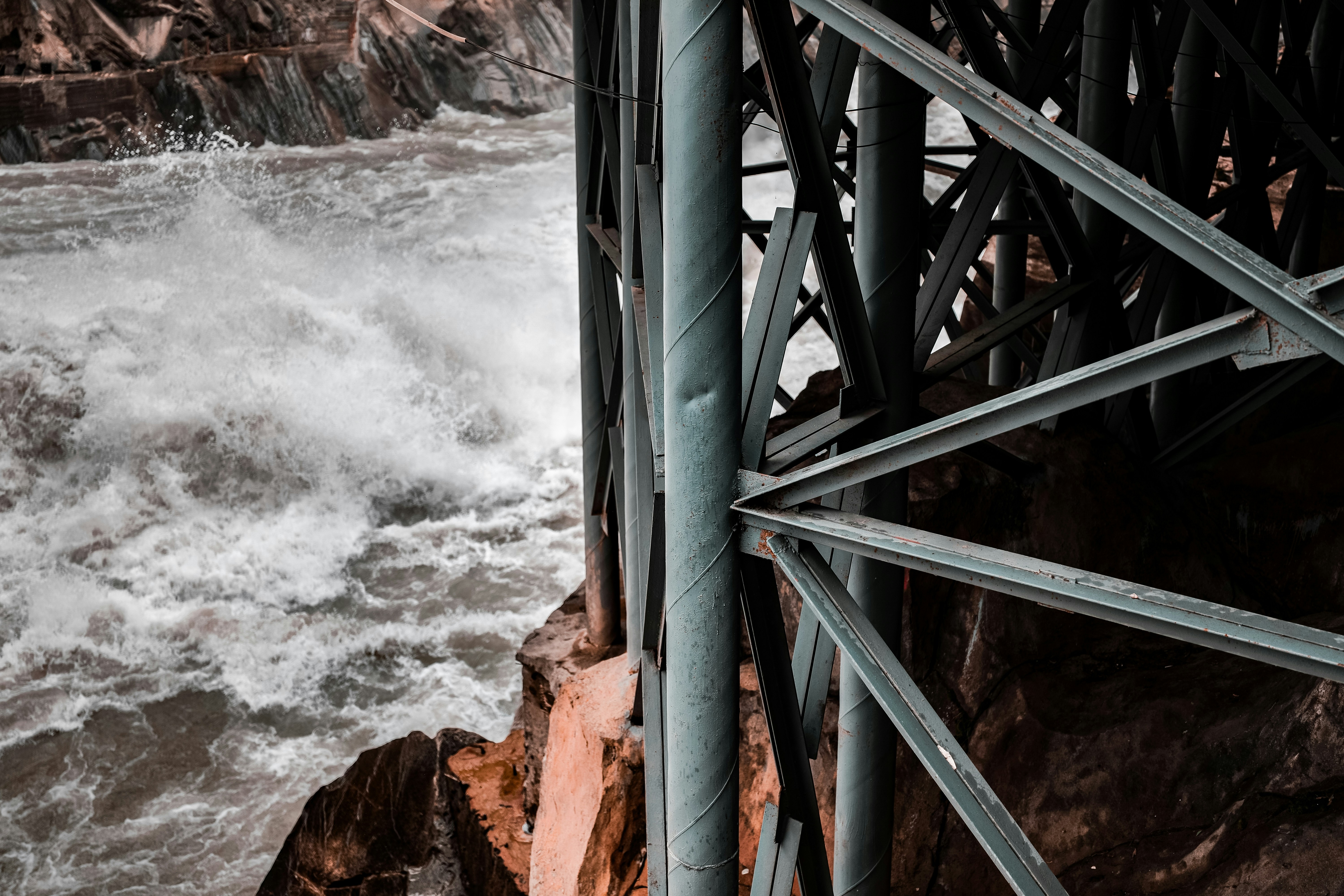 Crisscross of Steel Over Ocean Spray