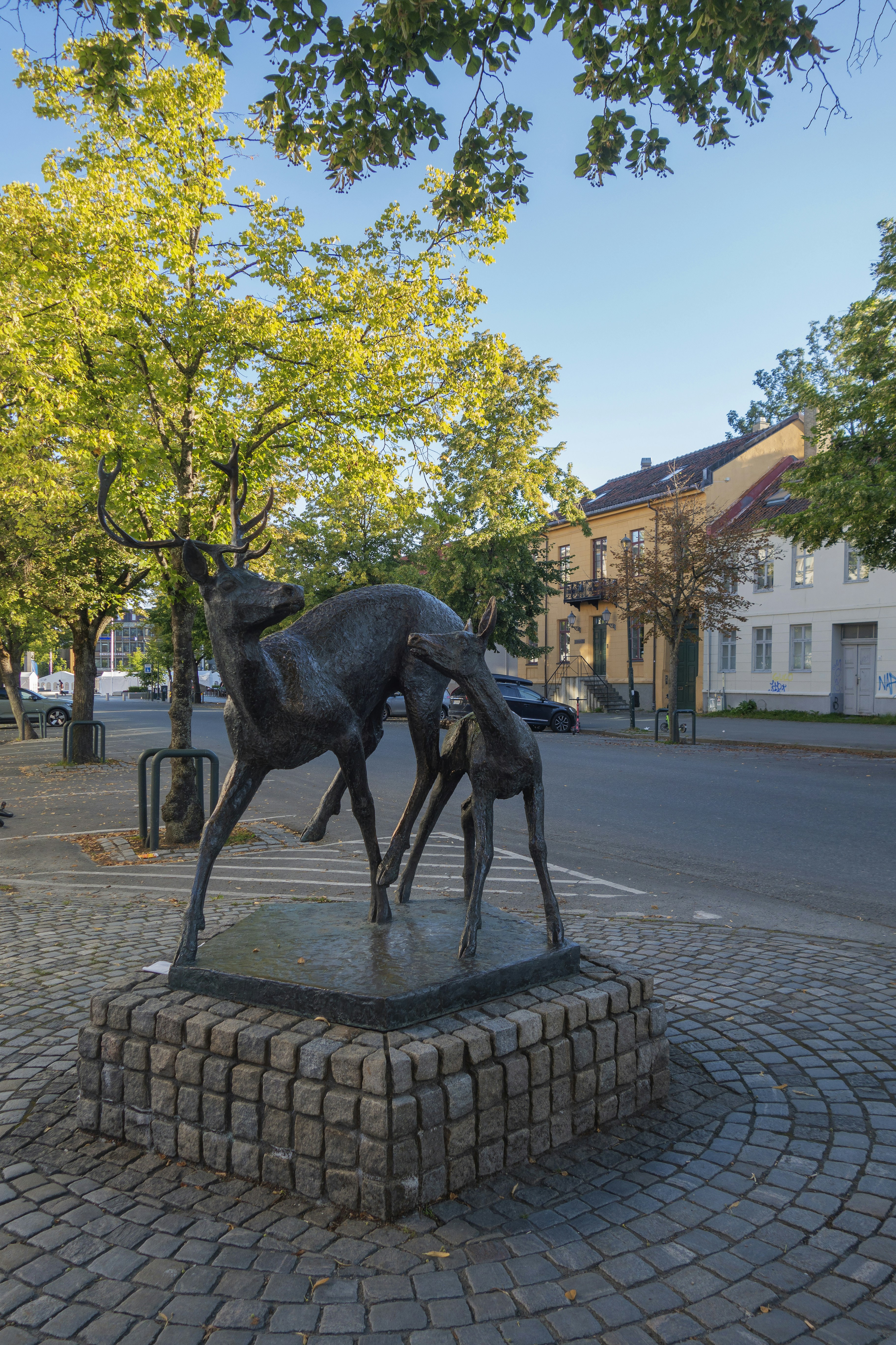 Bronze Deer Duo in a Sunlit City Square