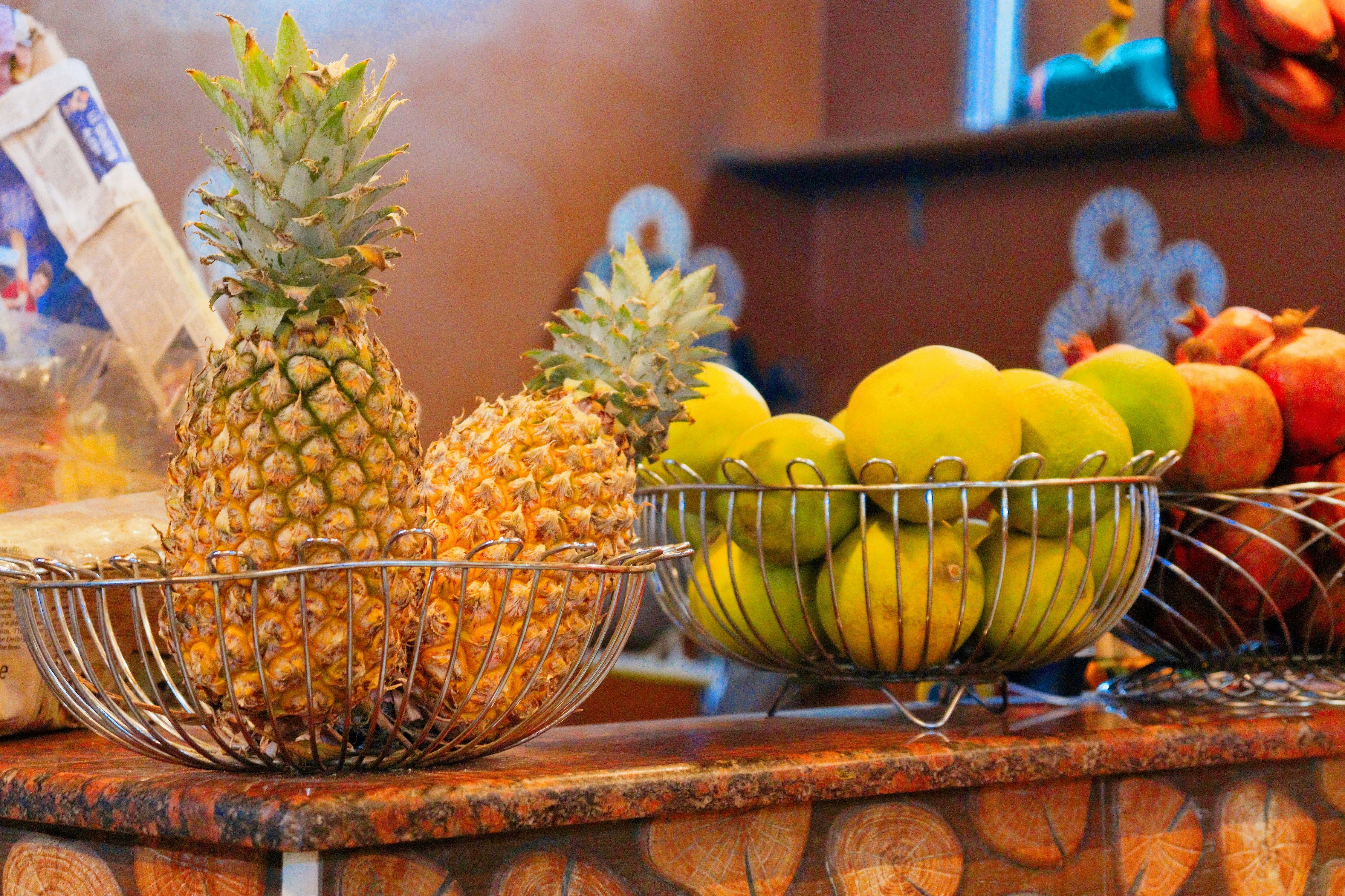 A table topped with baskets filled with fruit photo – Free Food Image ...