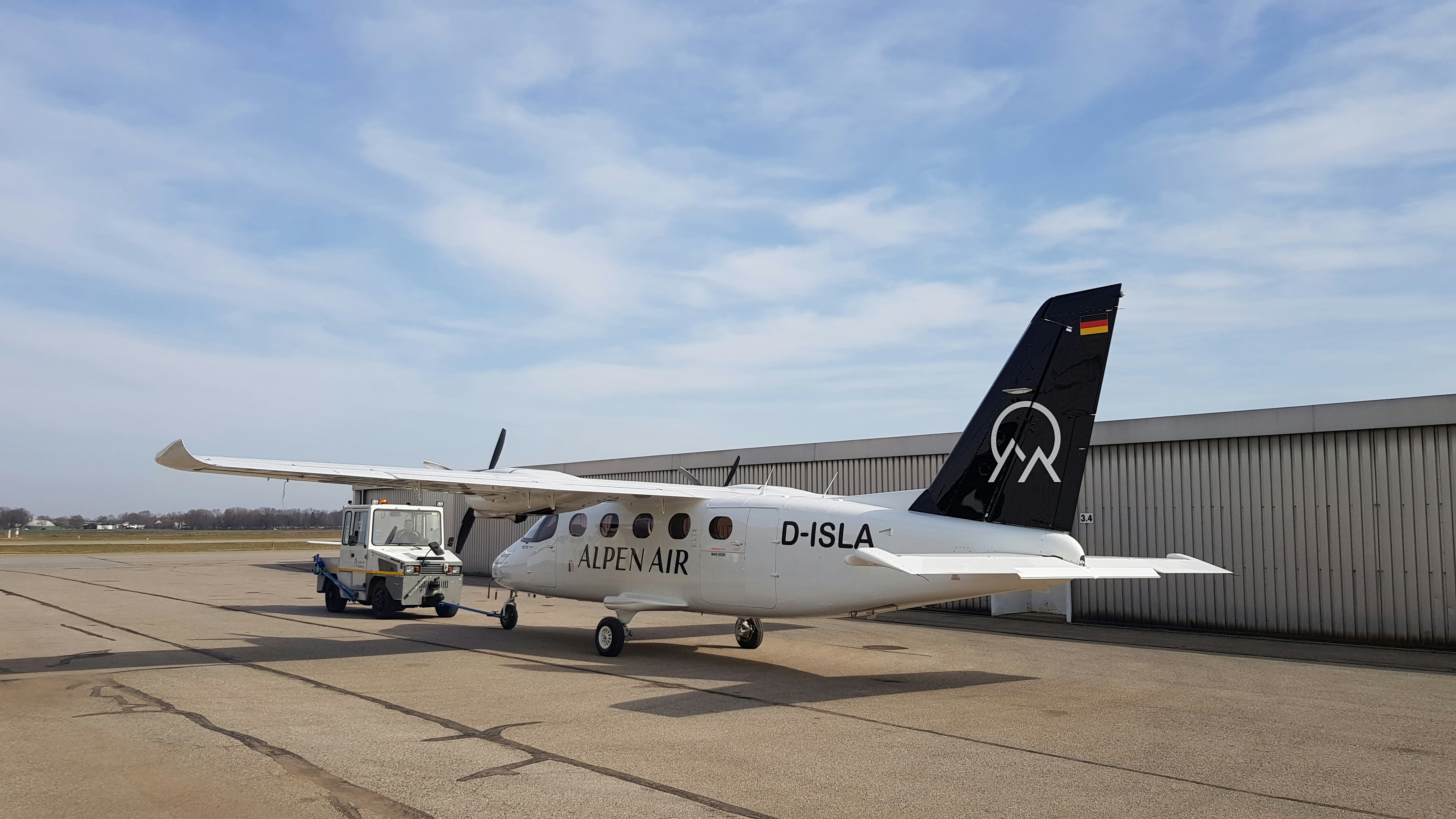 A Sunset-tinted Cessna Stands Ready at the Tarmac