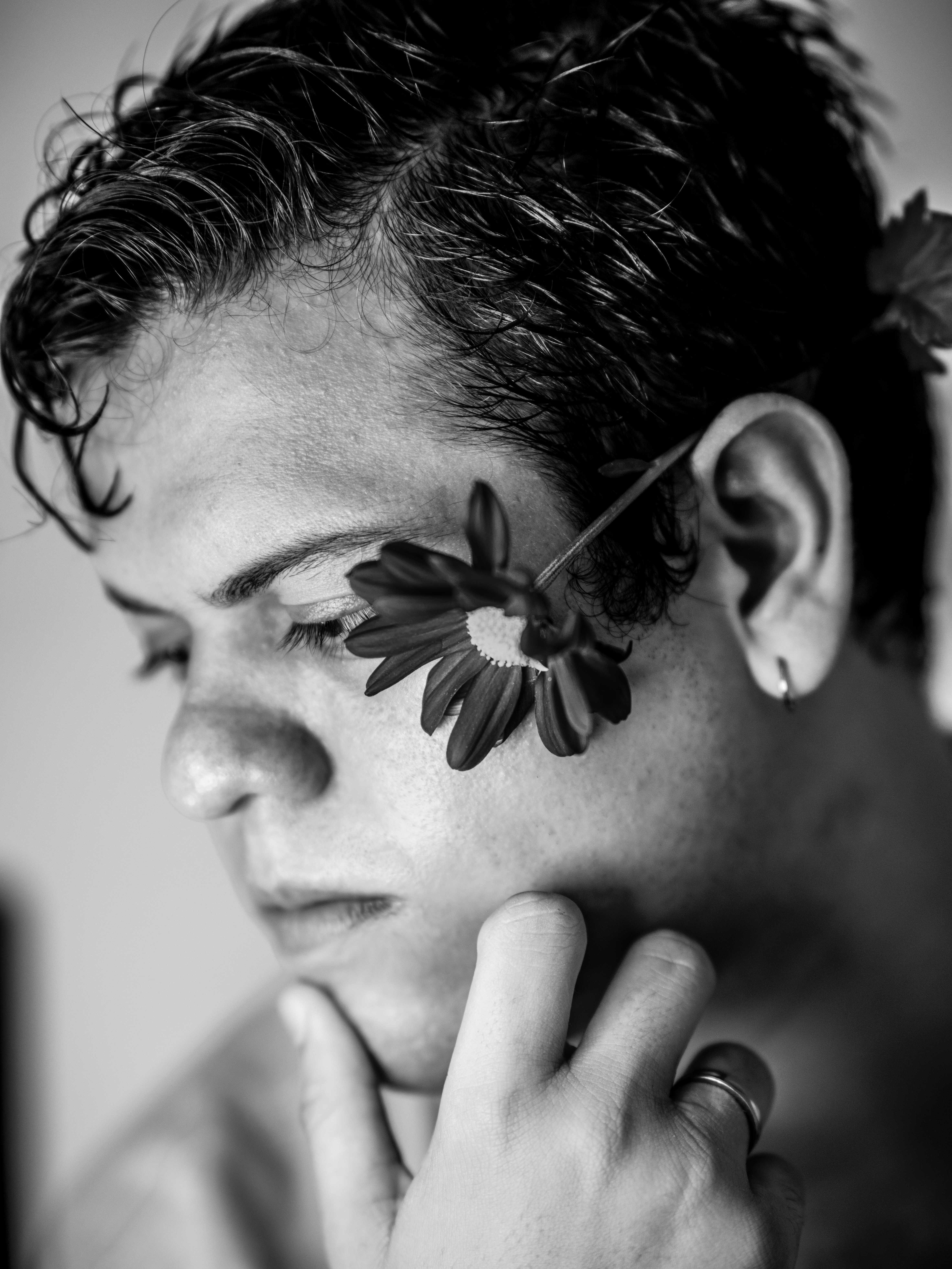 Petal at the Eye: A Quiet Black-and-White Portrait