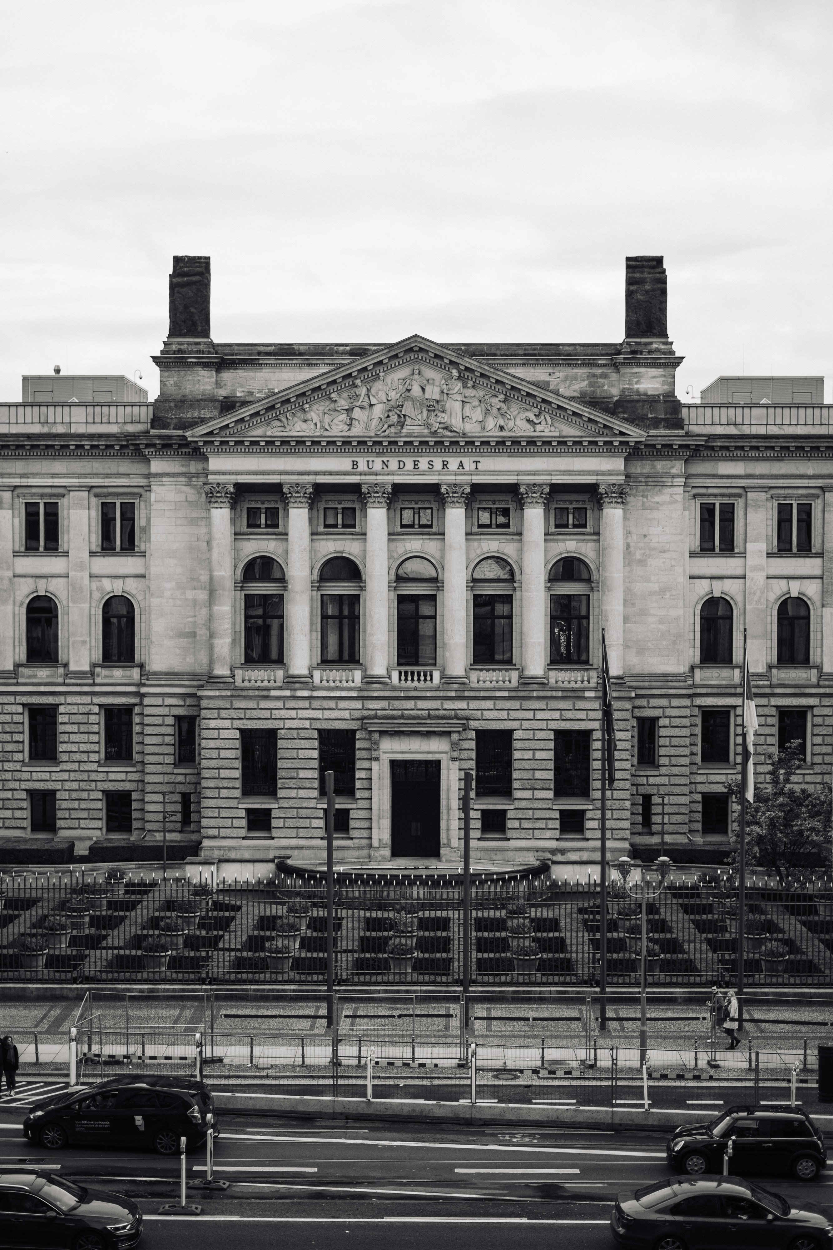 a black and white photo of a large building