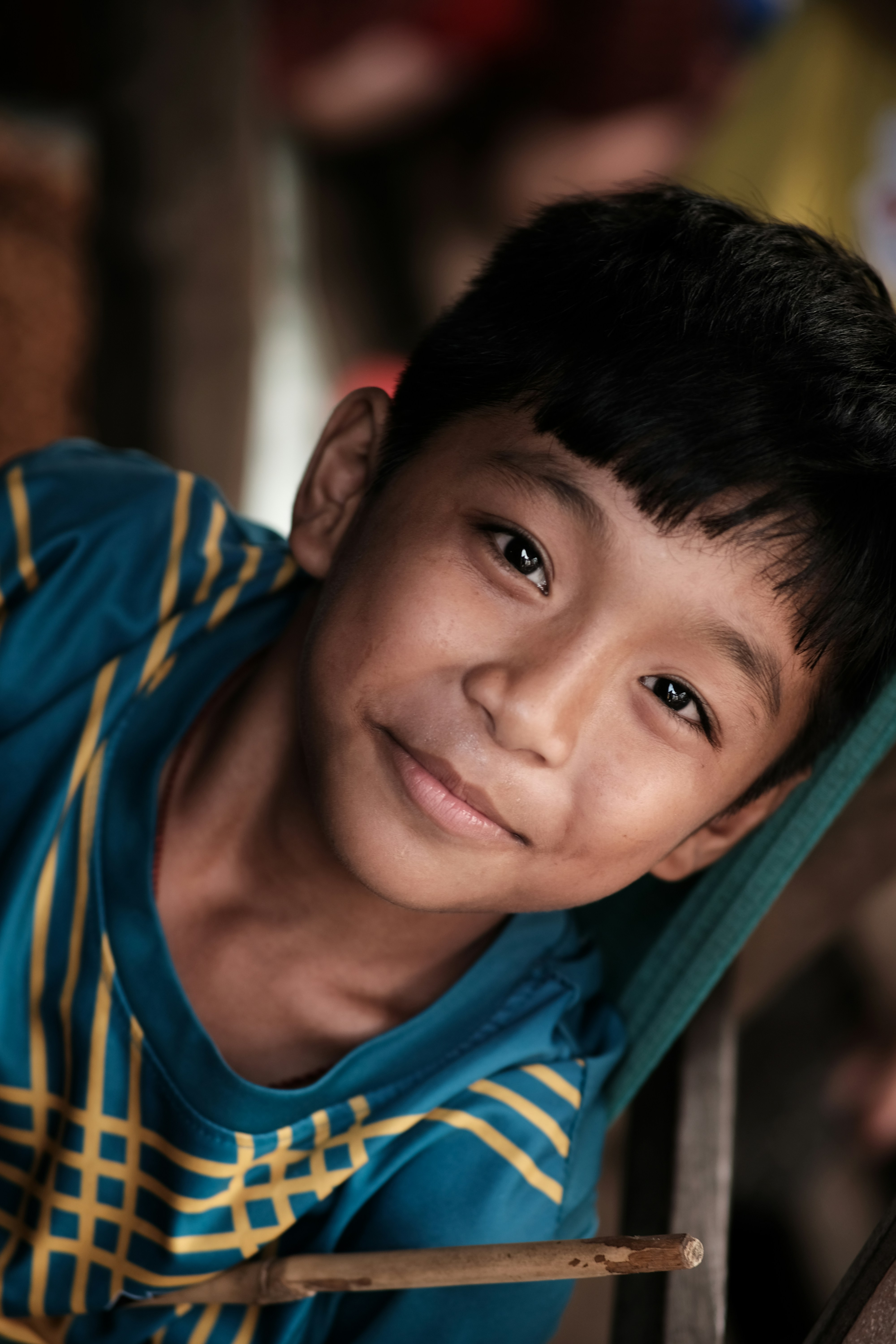 A young boy is smiling for the camera photo – Free Portrait Image on ...