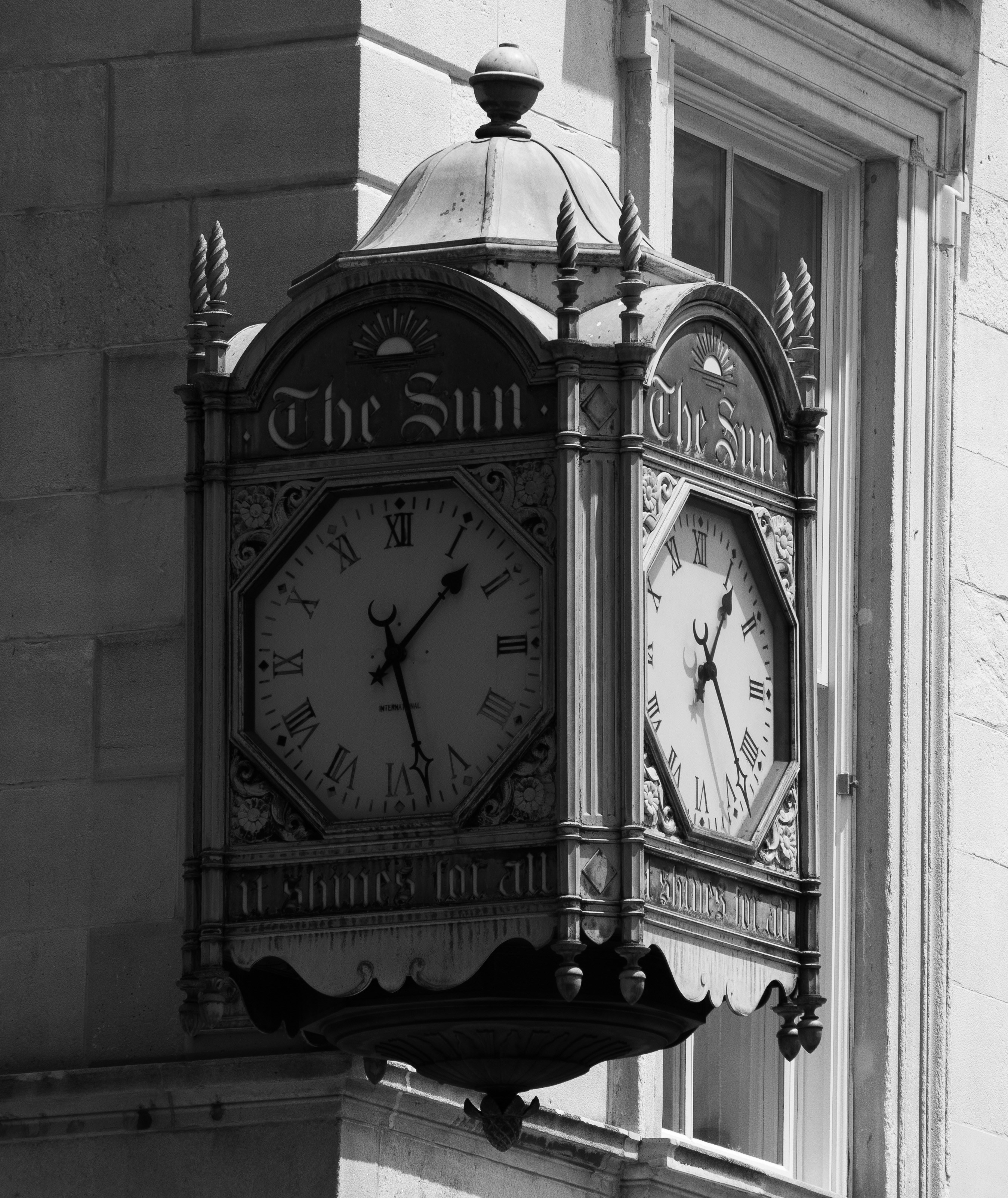 The Sun Clock: Ornate Timekeeper Clinging to a City Facade