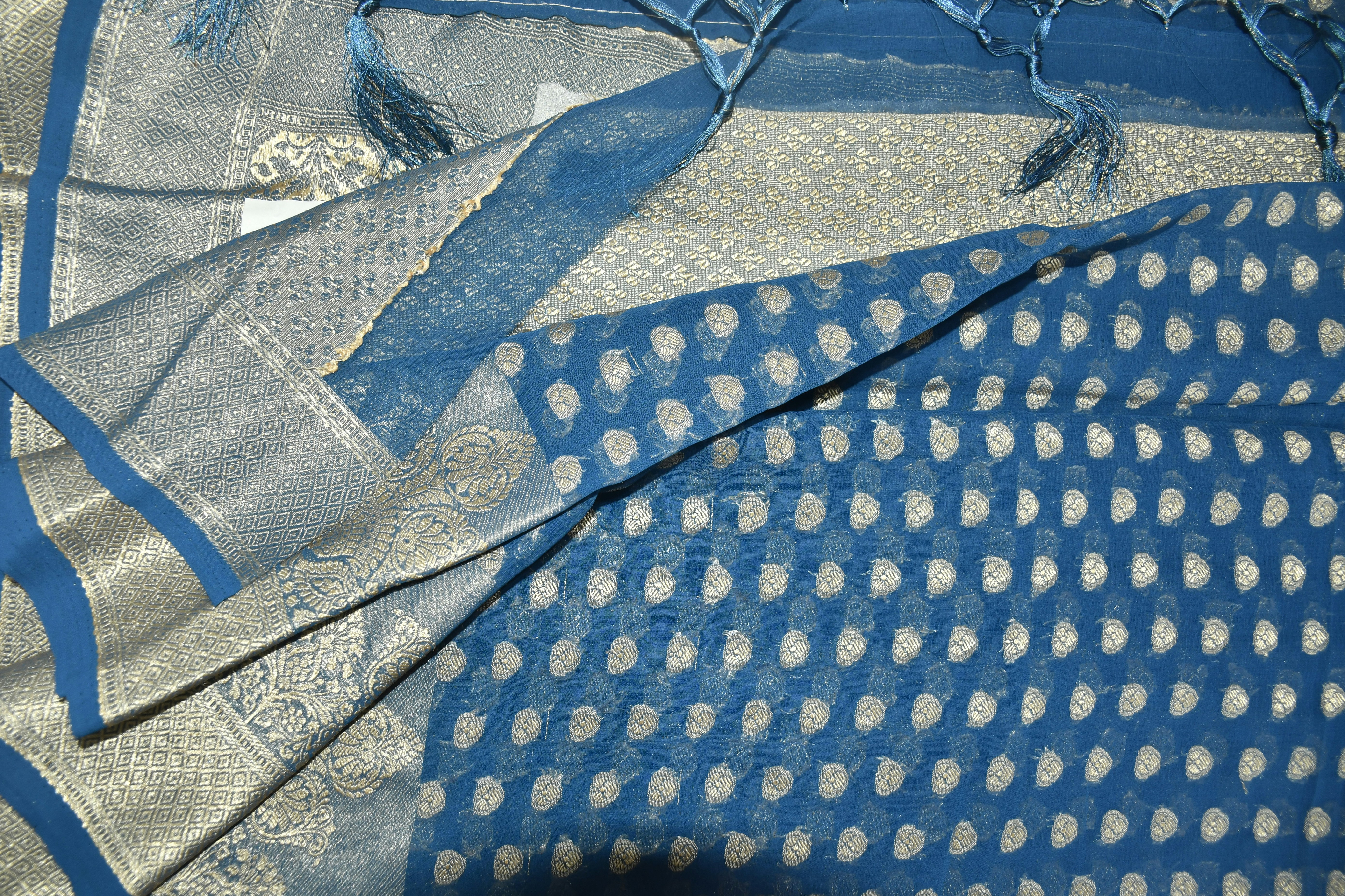 Indigo Drapes: Quiet Folds and Dotted Texture