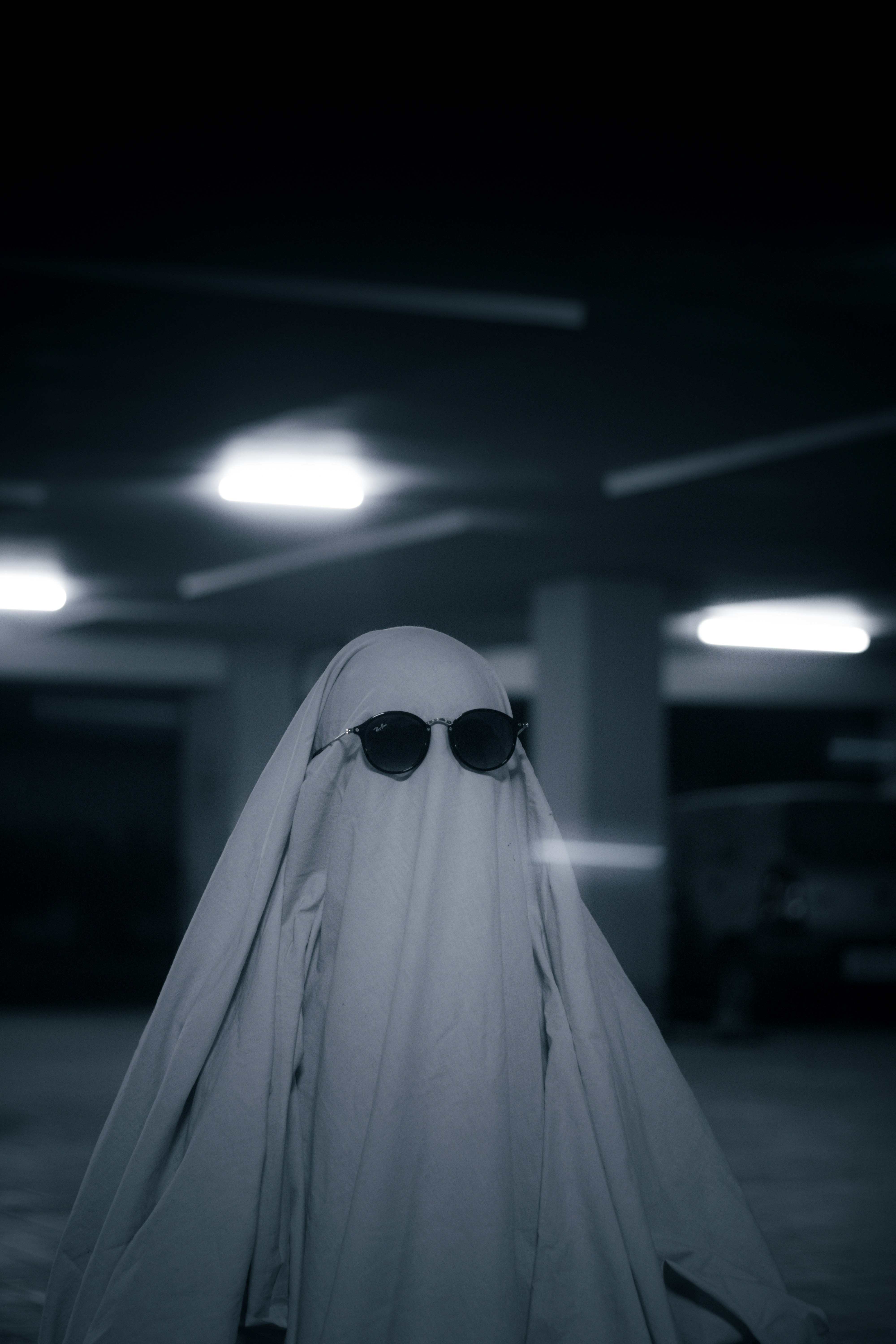 A ghost wearing sunglasses and a white cloak photo – Free Photography ...
