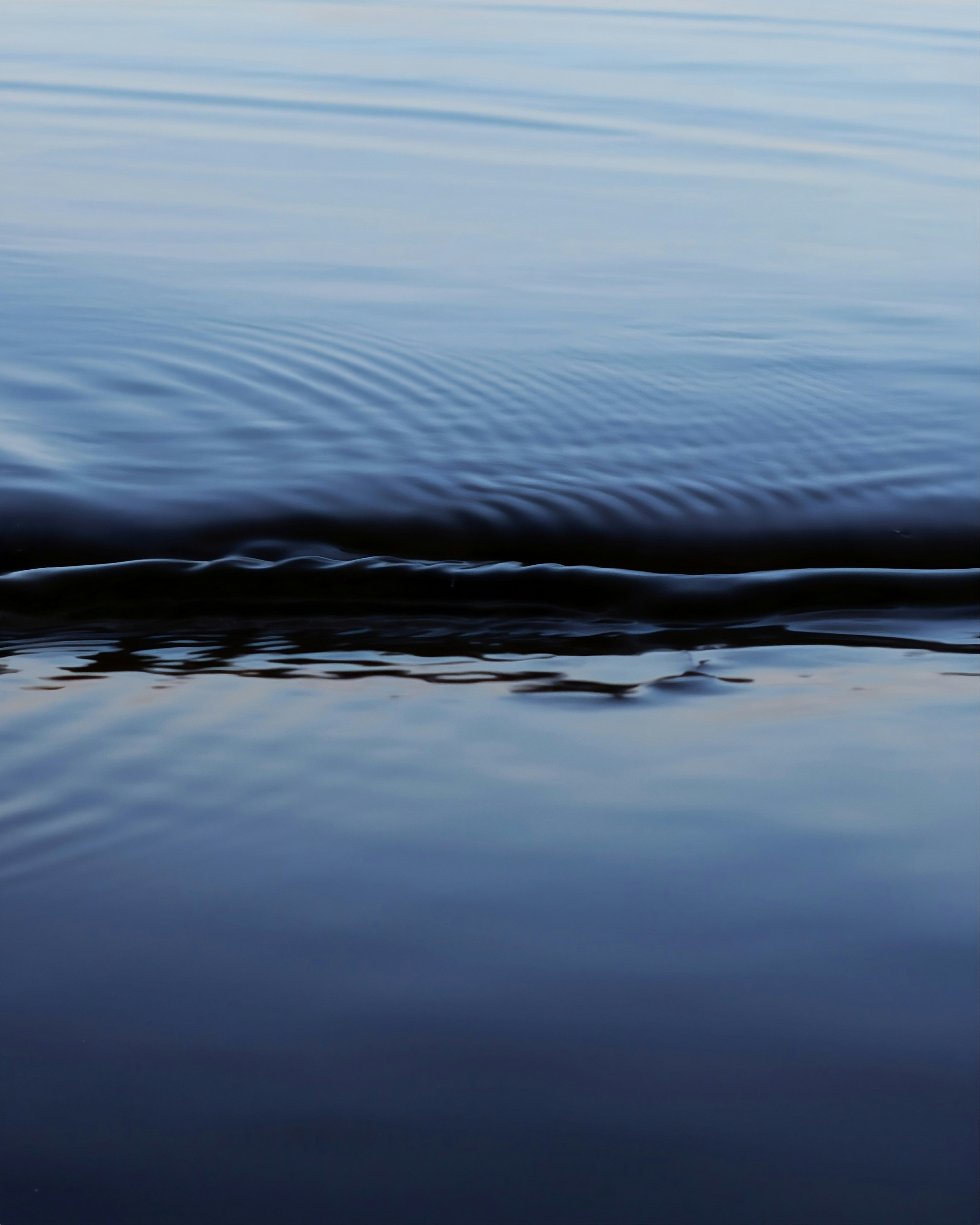 A large body of water with ripples in it photo – Free Nature Image on ...