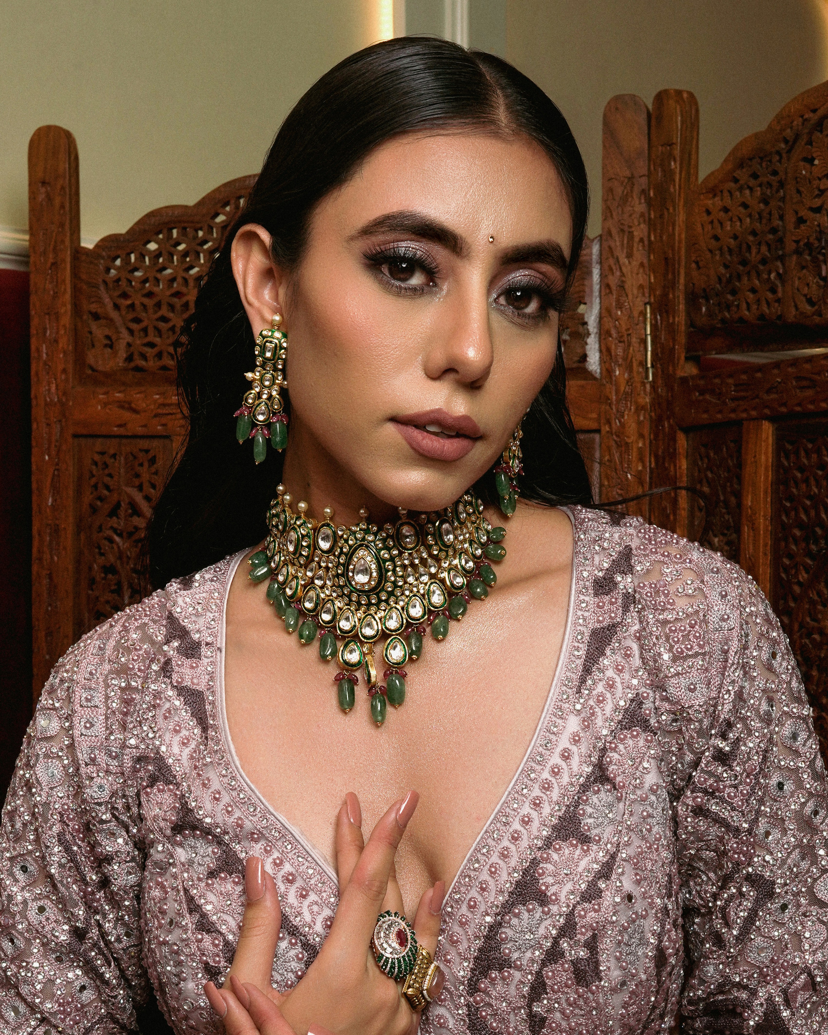 Gilded Gaze: Pearls, Emeralds, and a Regal Portrait