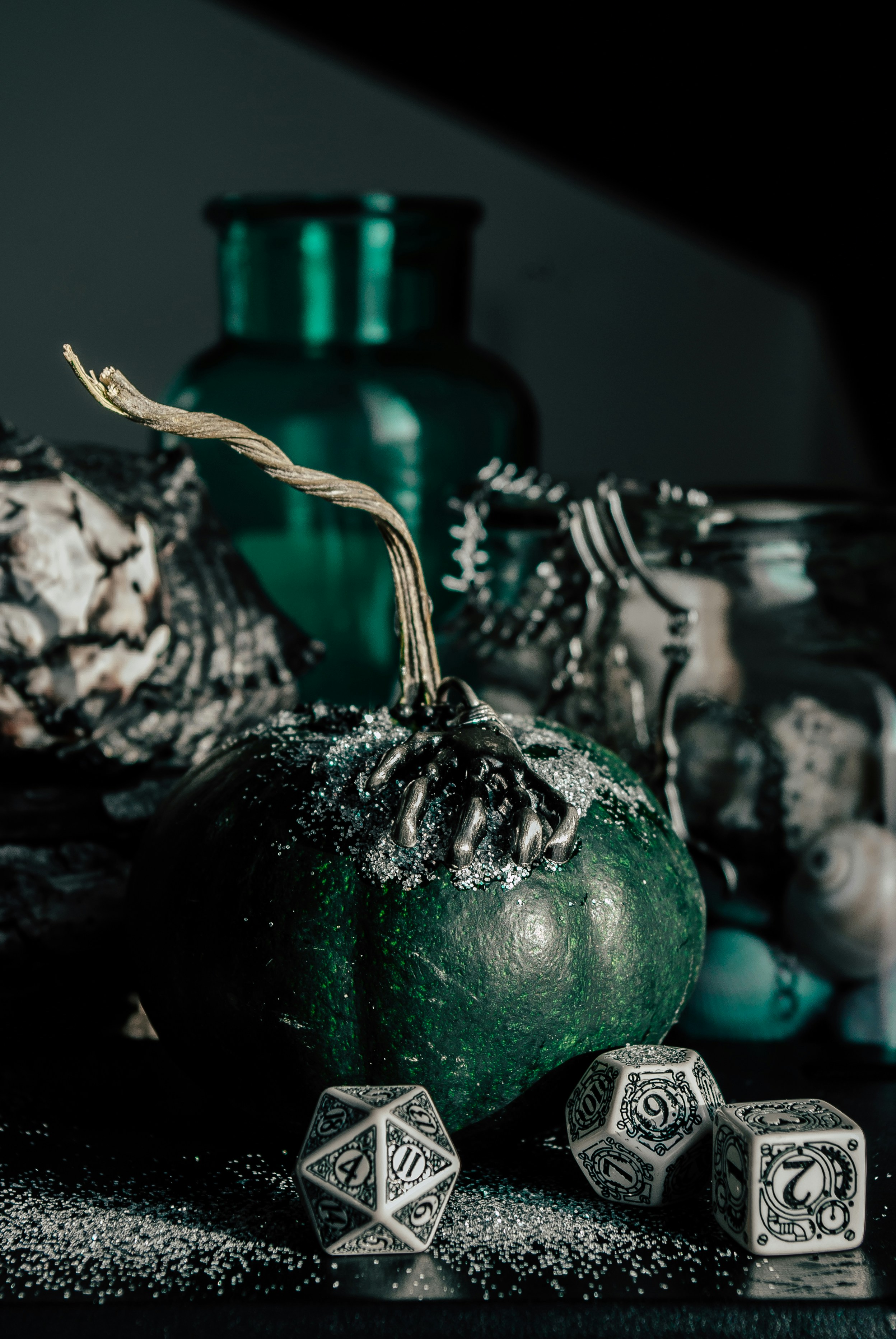 Teal Shadows: A Moody Still-Life with Pumpkin, Glyph Dice, and Dust