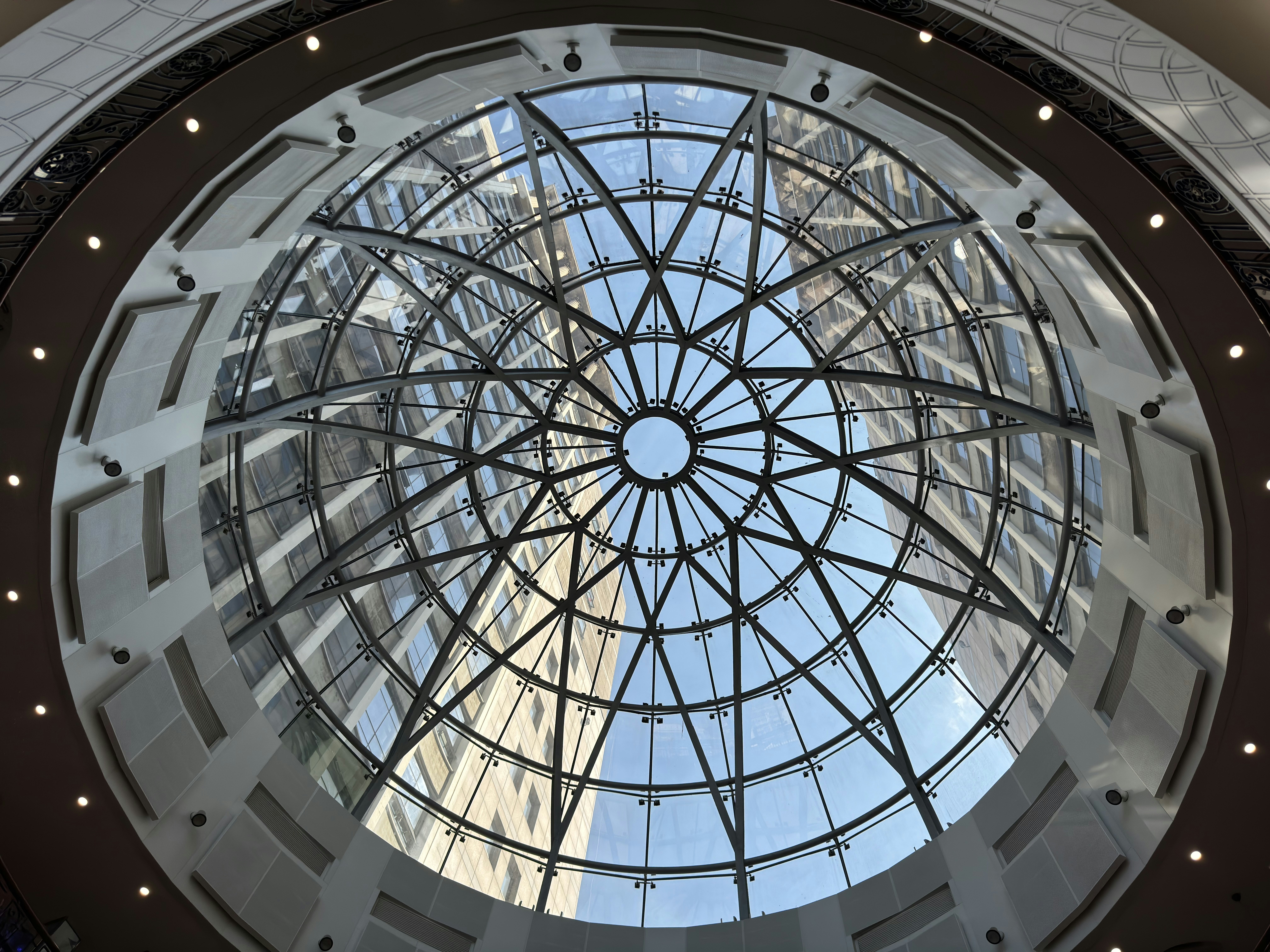 A circular glass ceiling in a building photo – Free Grey Image on Unsplash