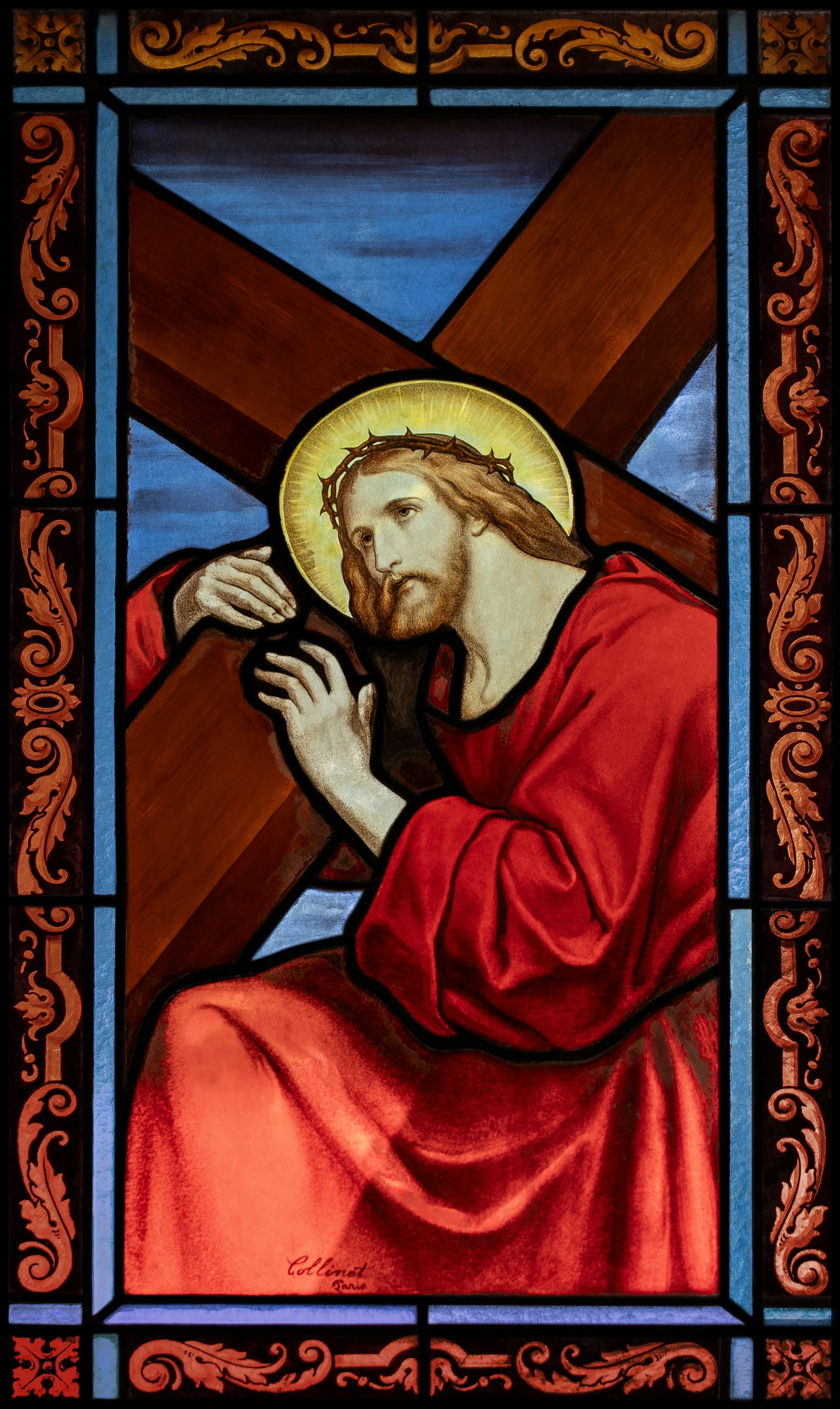 A painting of jesus holding a cross in a stained glass window photo ...