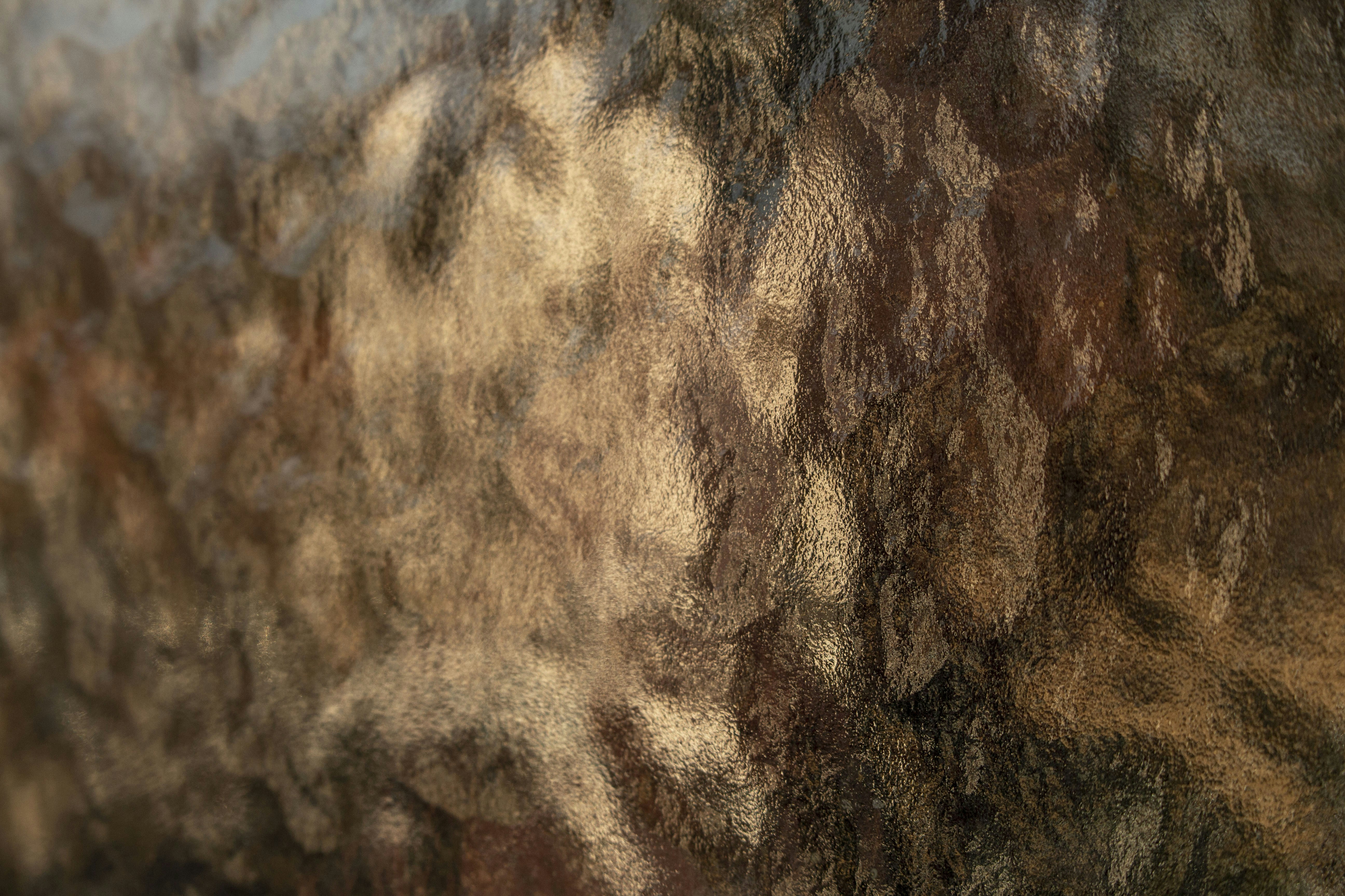 Sunlit Corrugations: Close-Up of Weathered Rock Surface