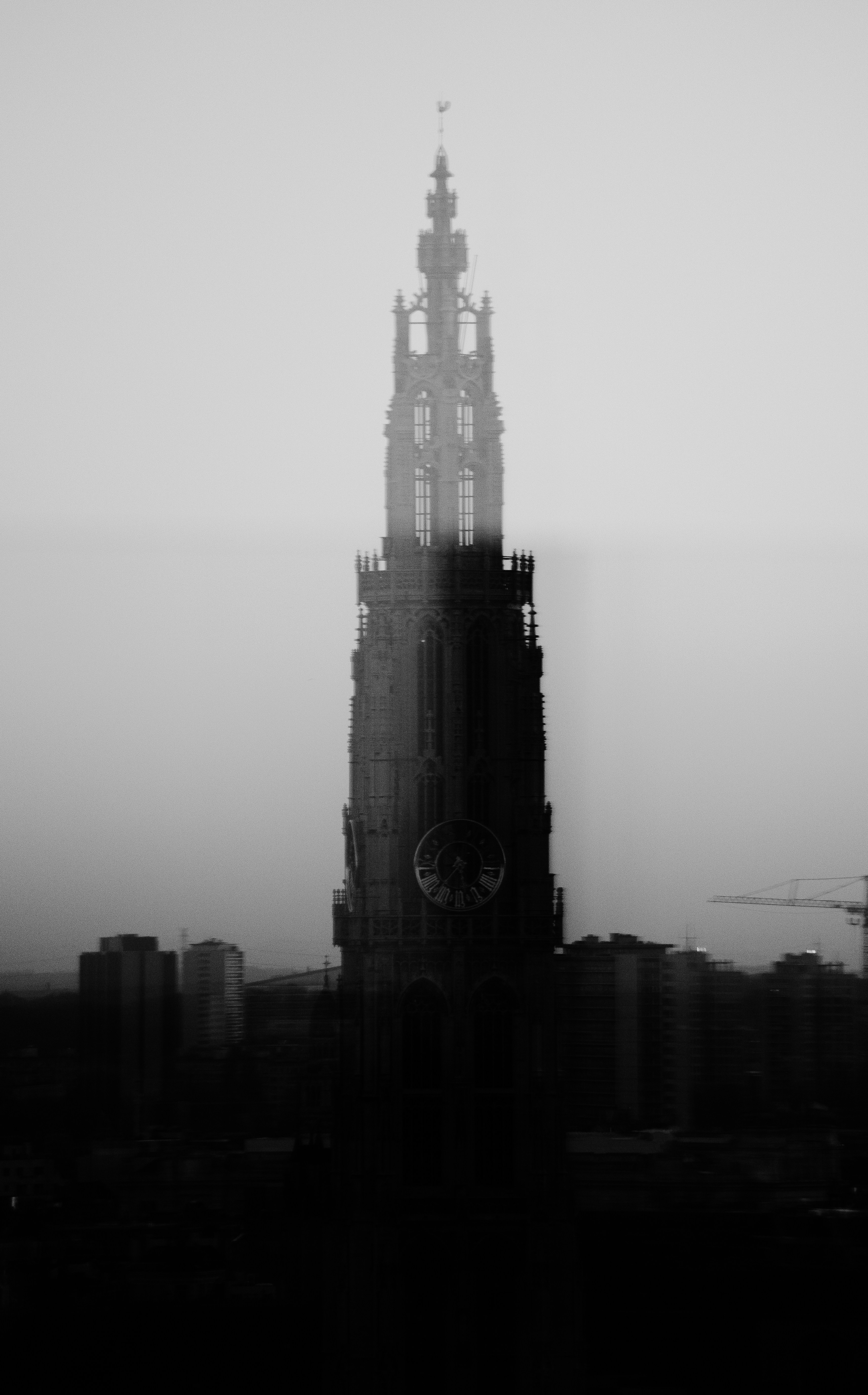 Mist-Wreathed Spire: The Silent Clocktower Over a Sleepy City