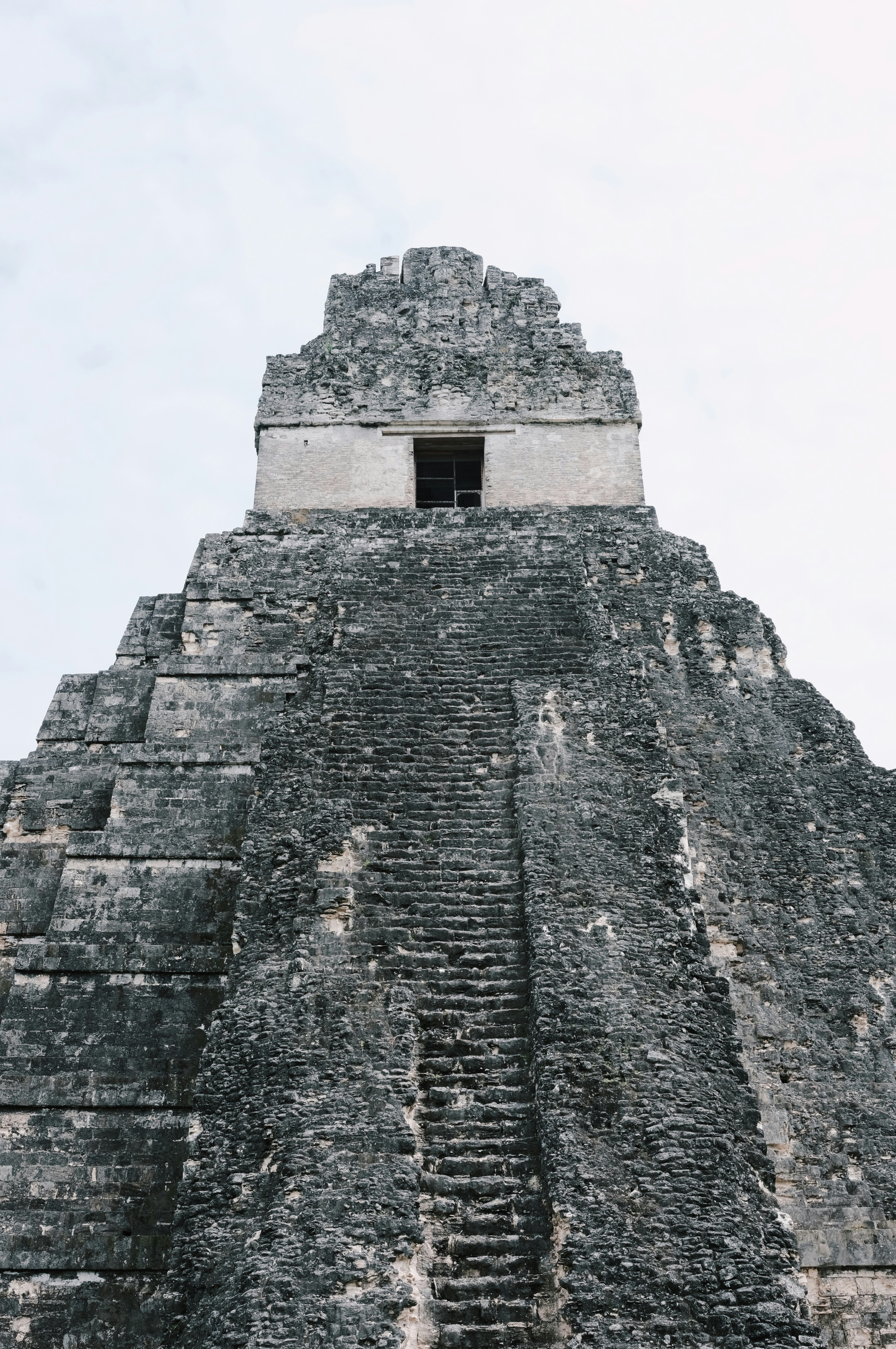 Staircase to the Summit: A Weathered Pyramid’s Quiet Rise