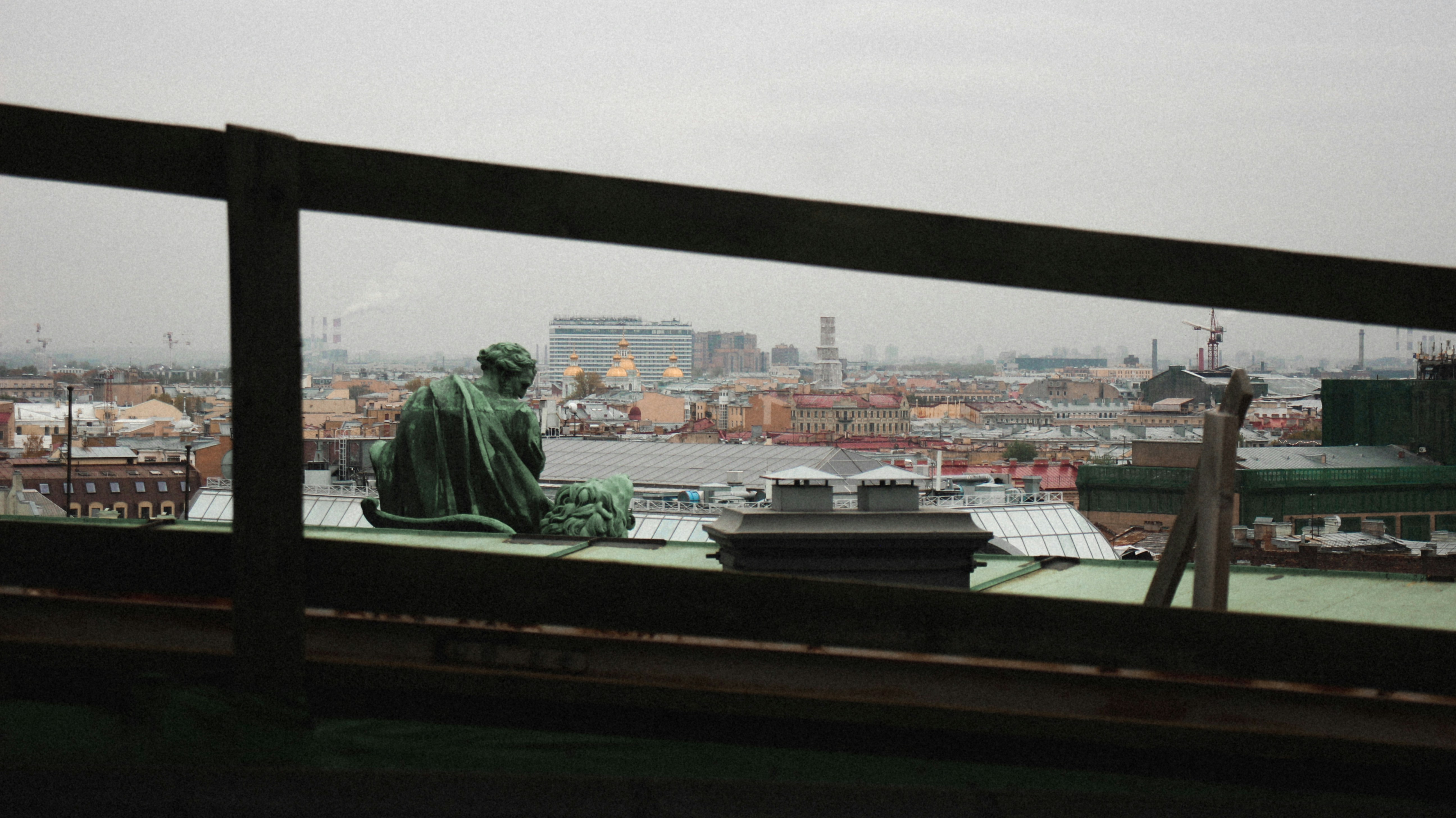 Copper-green Sentinel Overlooking a Quiet Cityscape