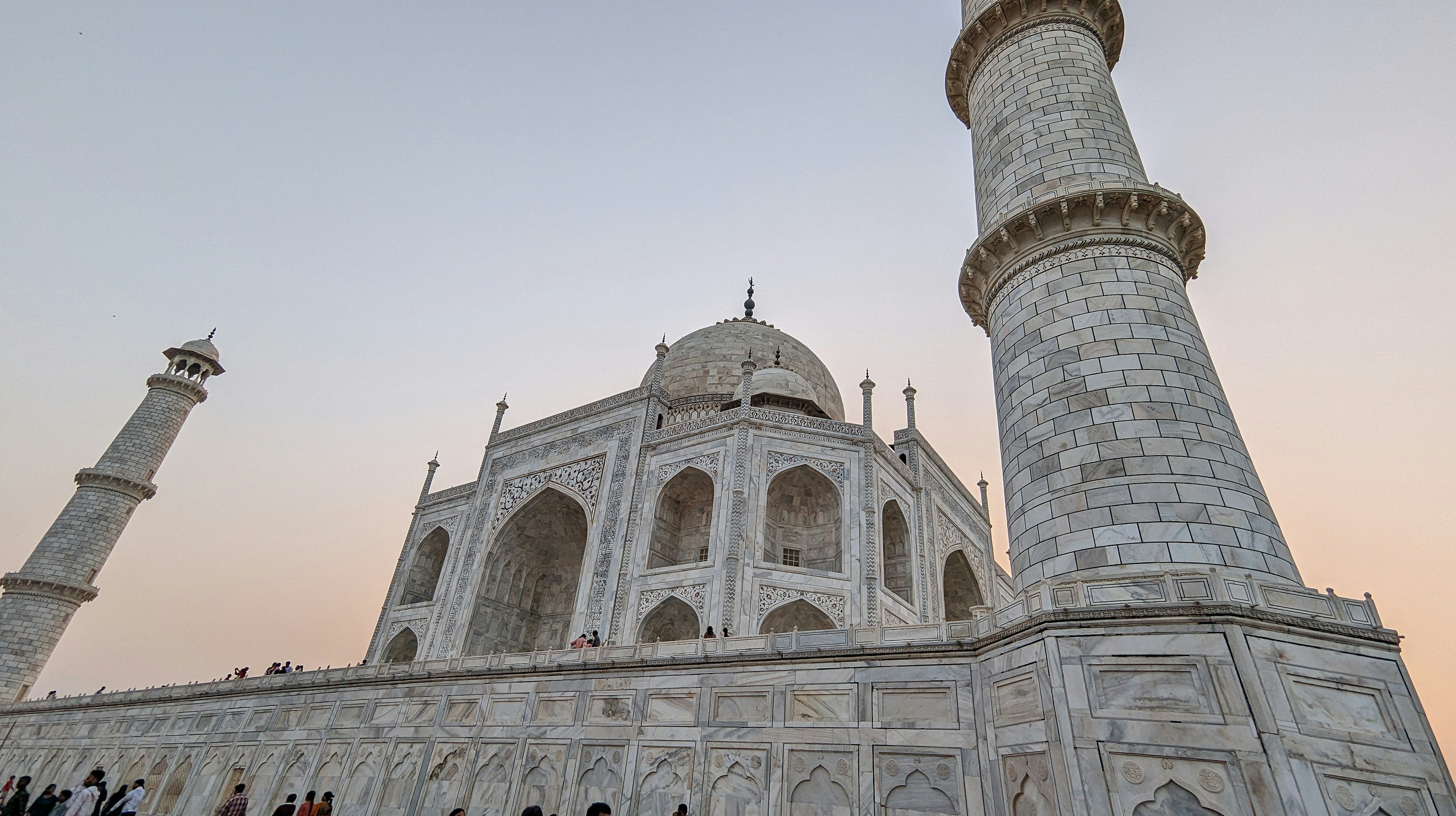 a group of people standing in front of a building