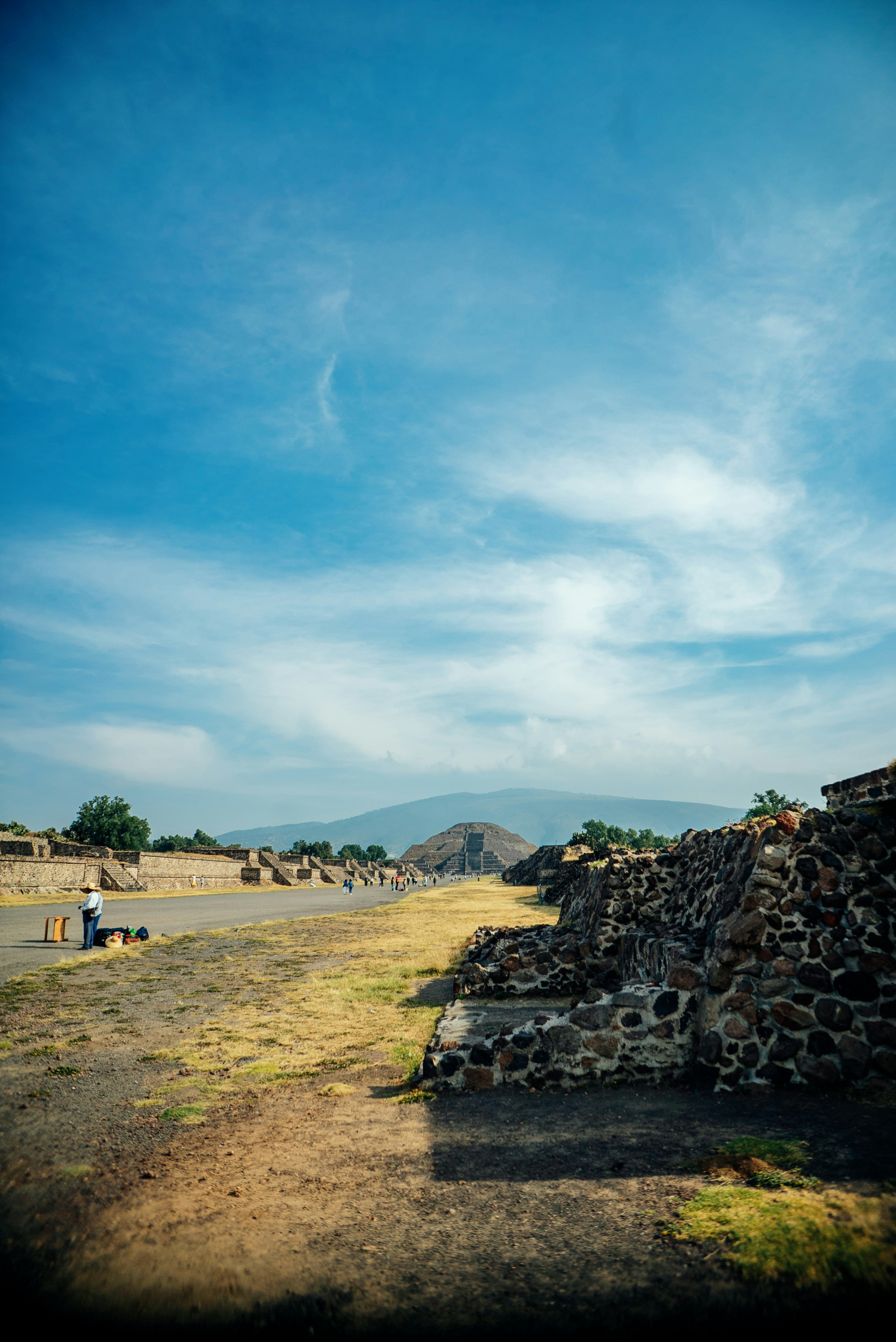 Road to the Distant Pyramid: Ruins, Sky, and Sunlit Stone