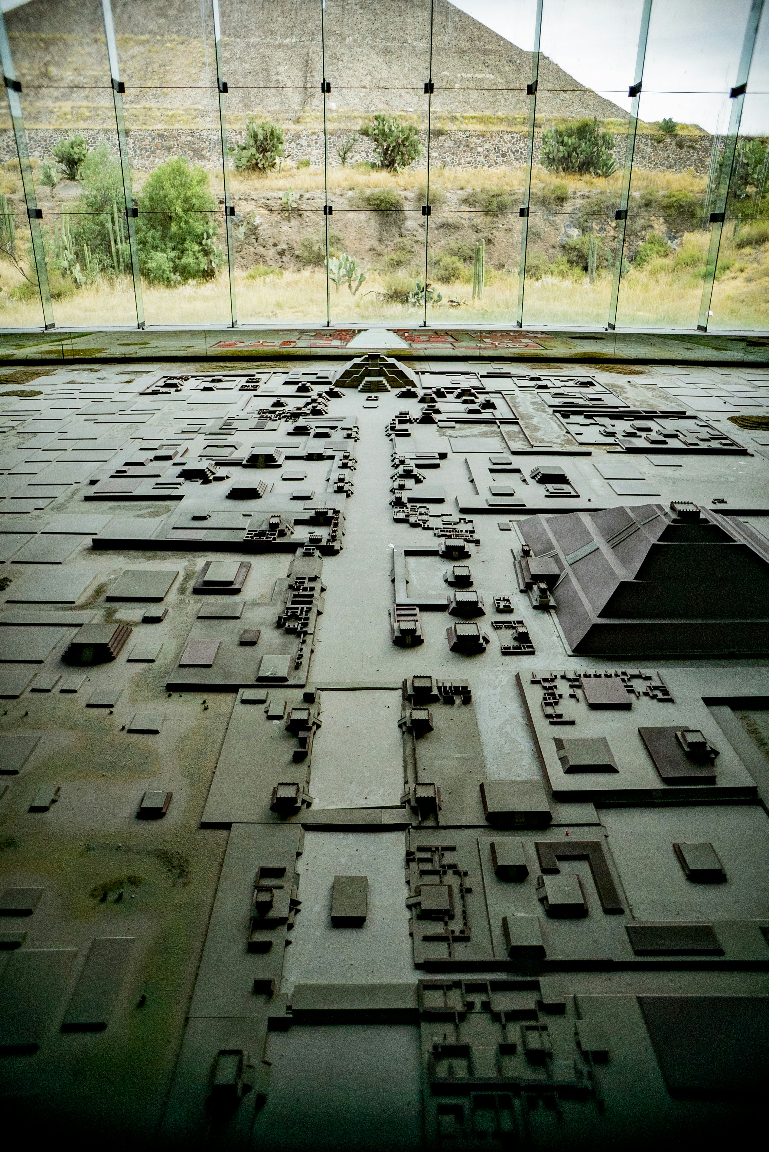 Under Glass, A Miniature Metropolis: A Precise Grid of Shadows