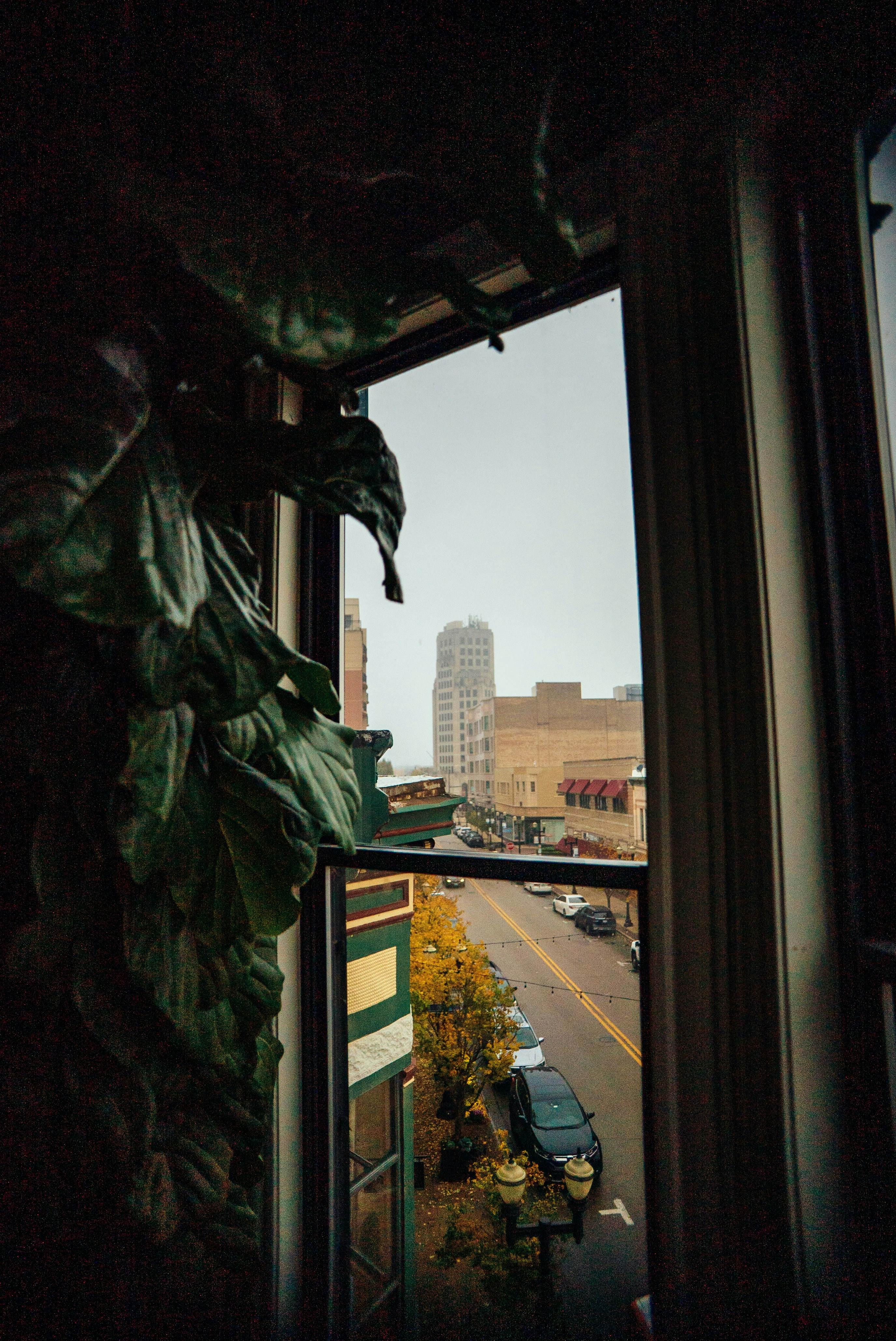 A view of a city from a window photo – Free Street Image on Unsplash