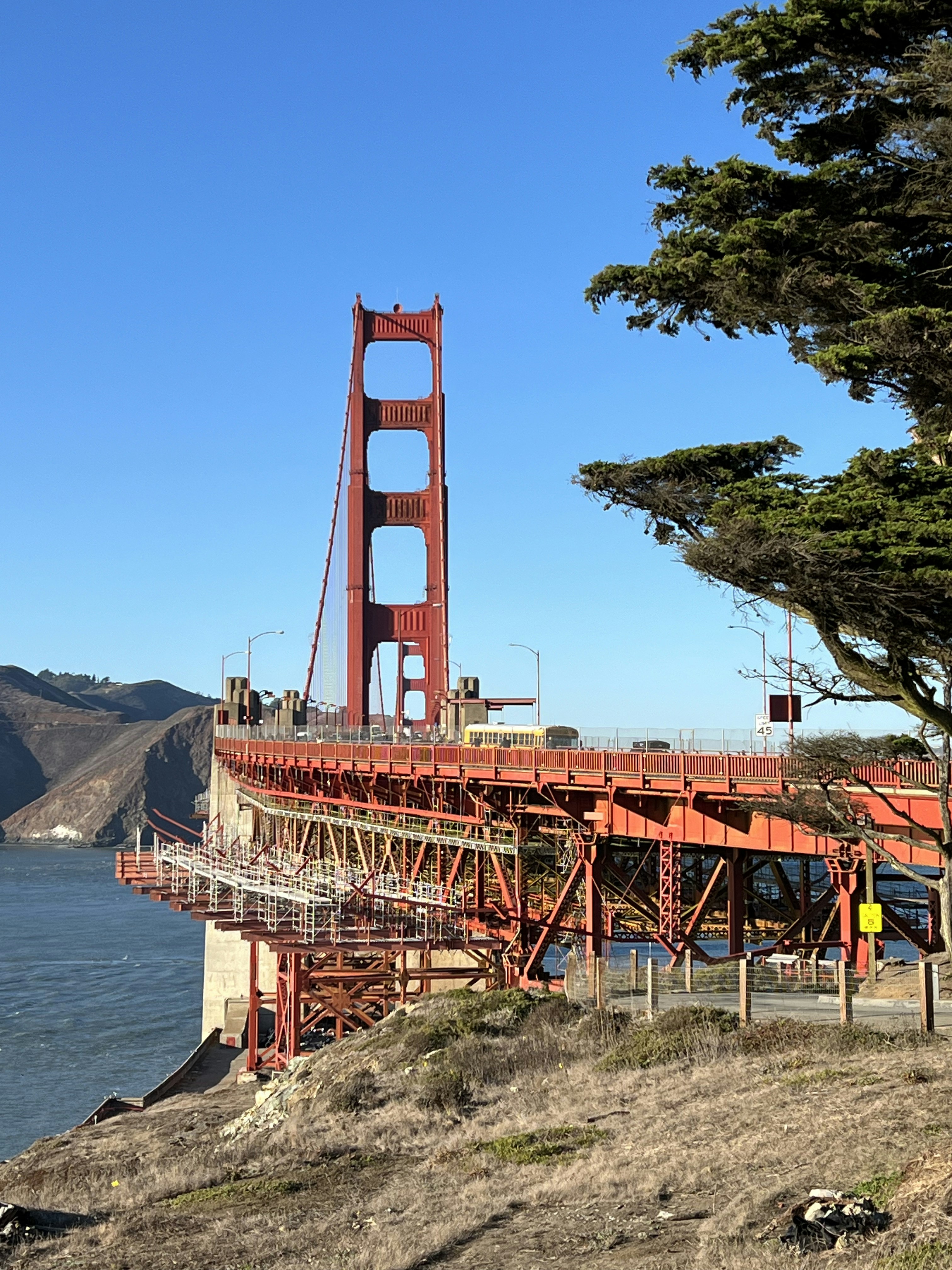 Crimson Tower Against Azure: Daylight Lines on the Golden Gate Bridge